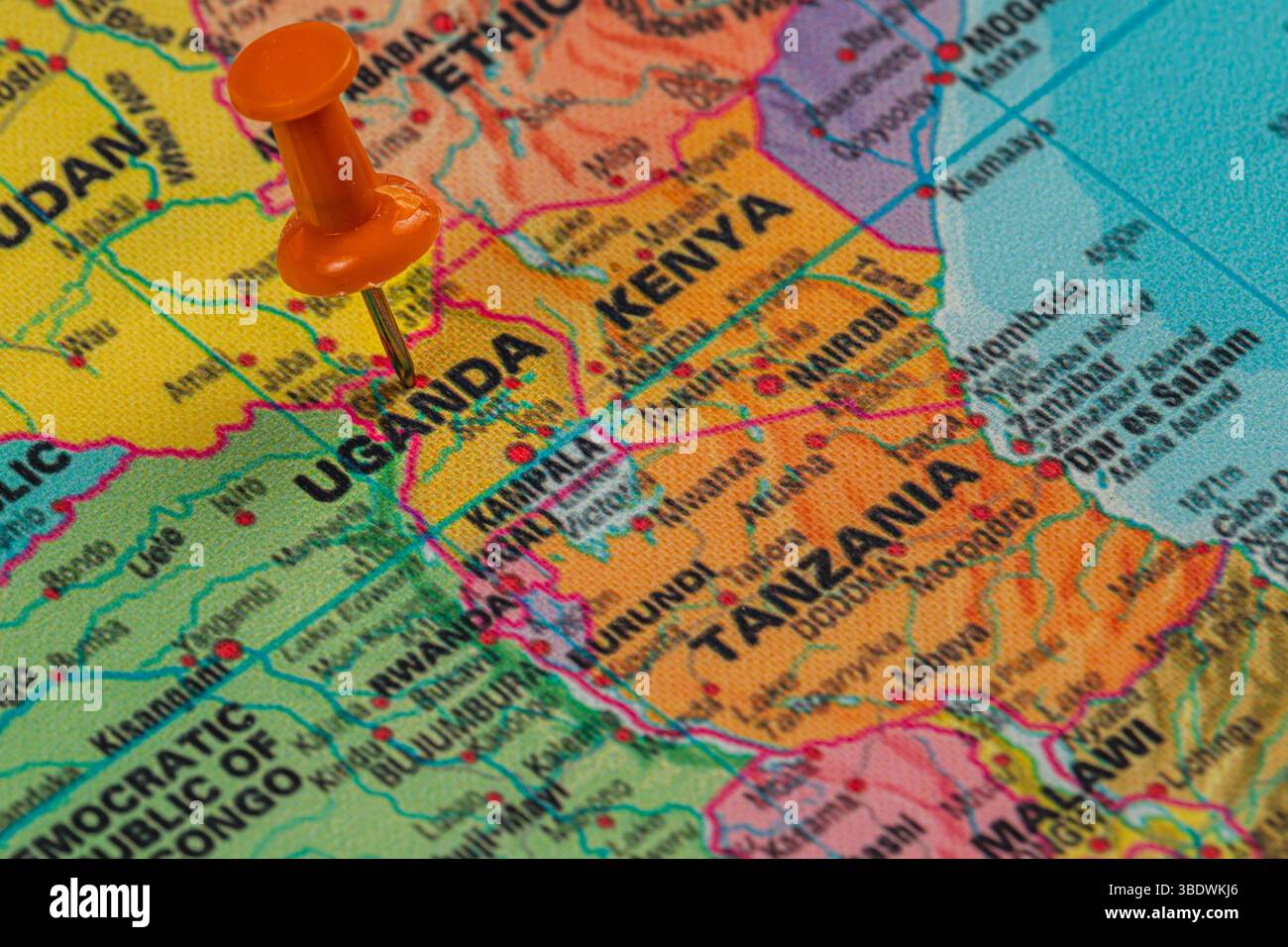 A detailed map highlights Uganda with an orange marker positioned on ...