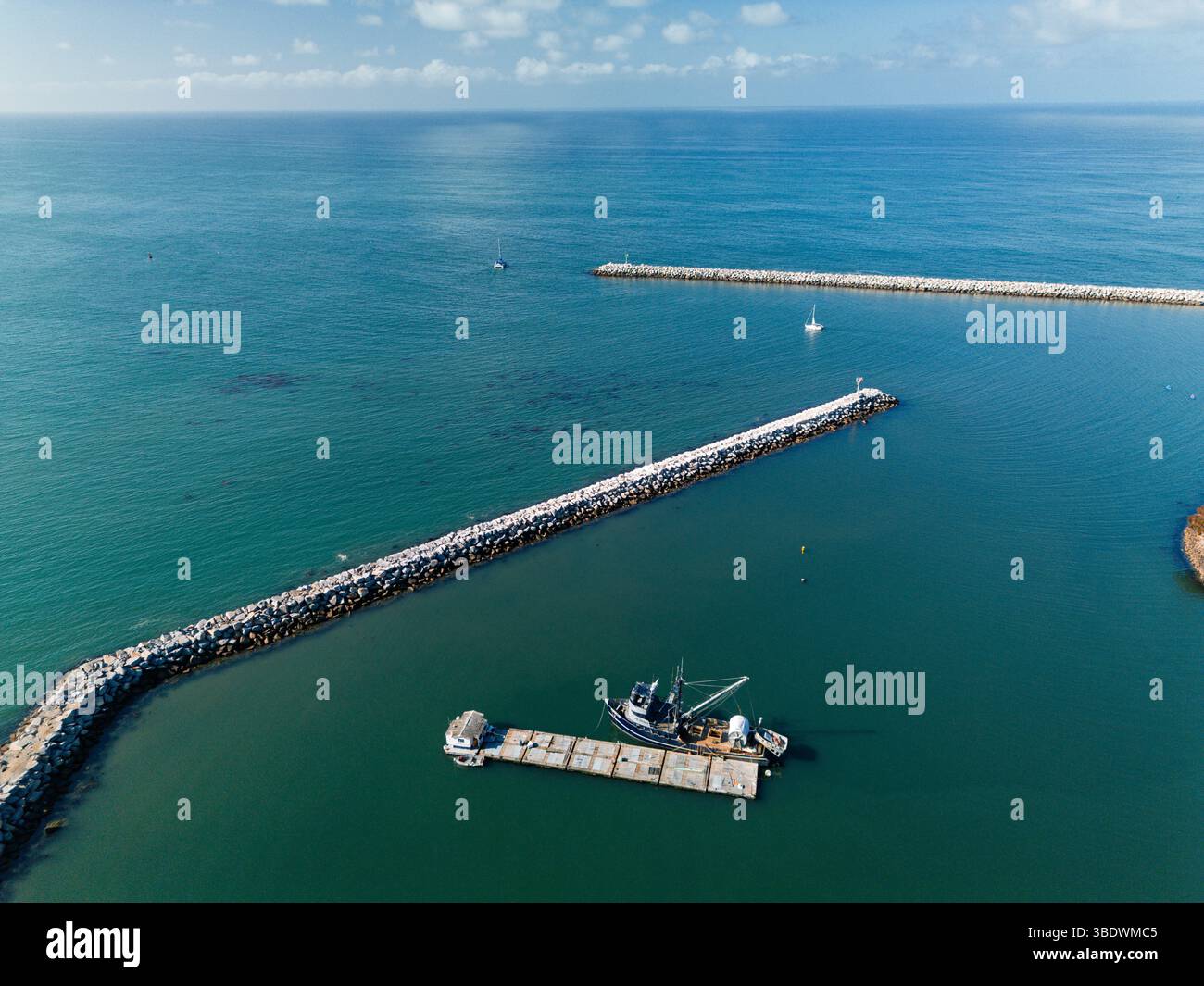 Aerial view of sail boat leaving Dana Point Harbor during morning Stock ...