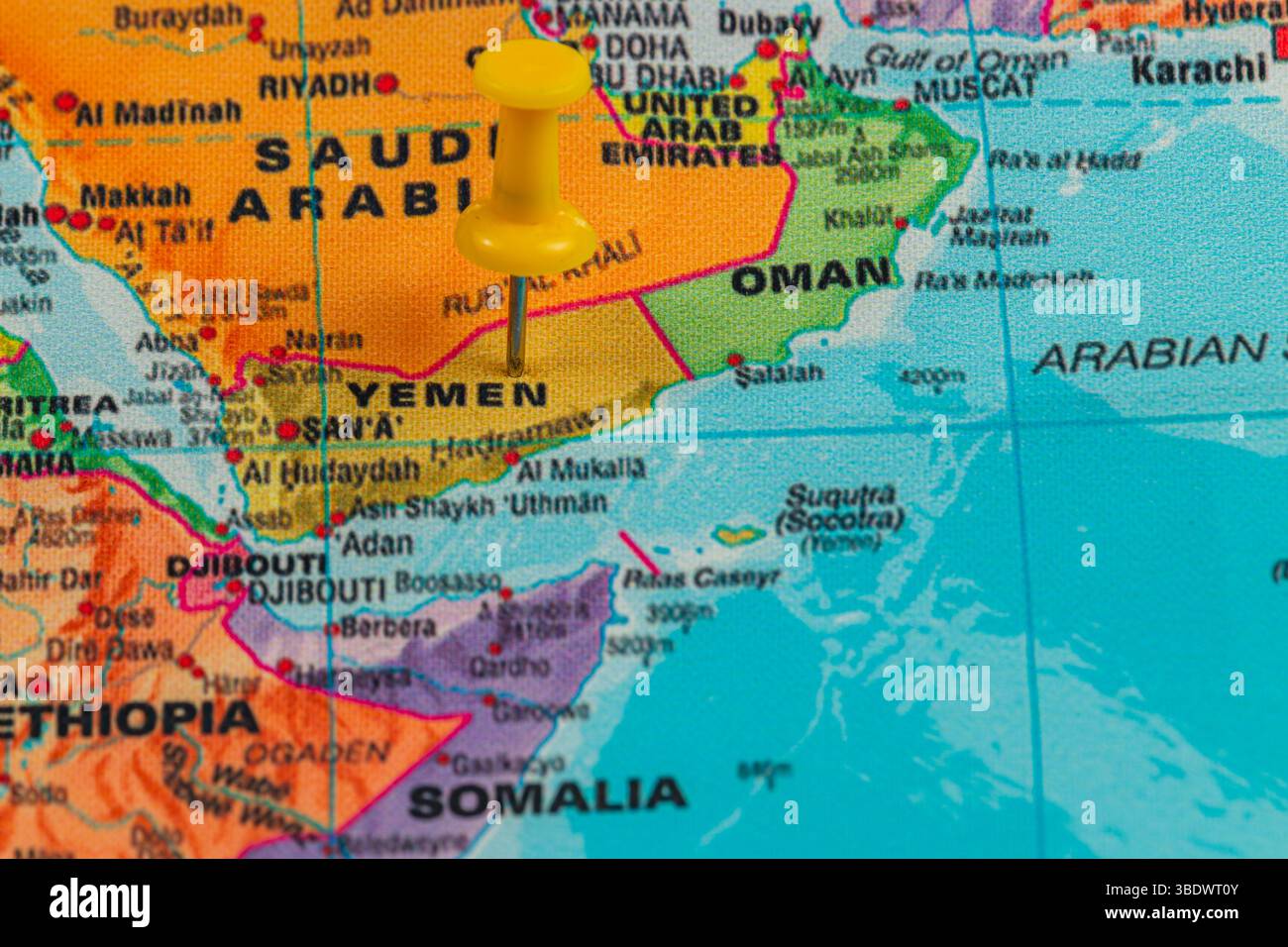 A colorful map displays Yemen's location within the Arabian Peninsula ...