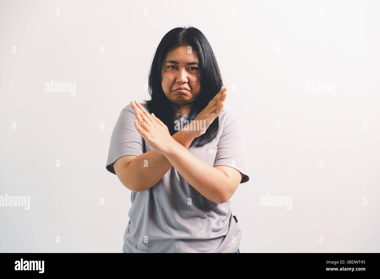 Asian girl expresses dislike, person express negative feeling, concept ...