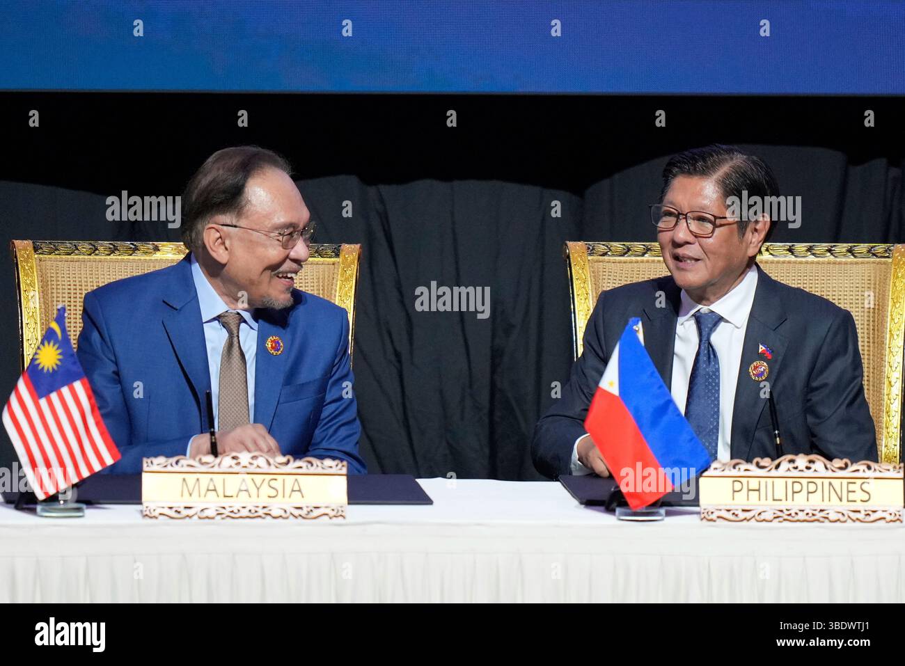 Malaysia's Prime Minister Anwar Ibrahim, left, and Philippine President Ferdinand Marcos Jr ...