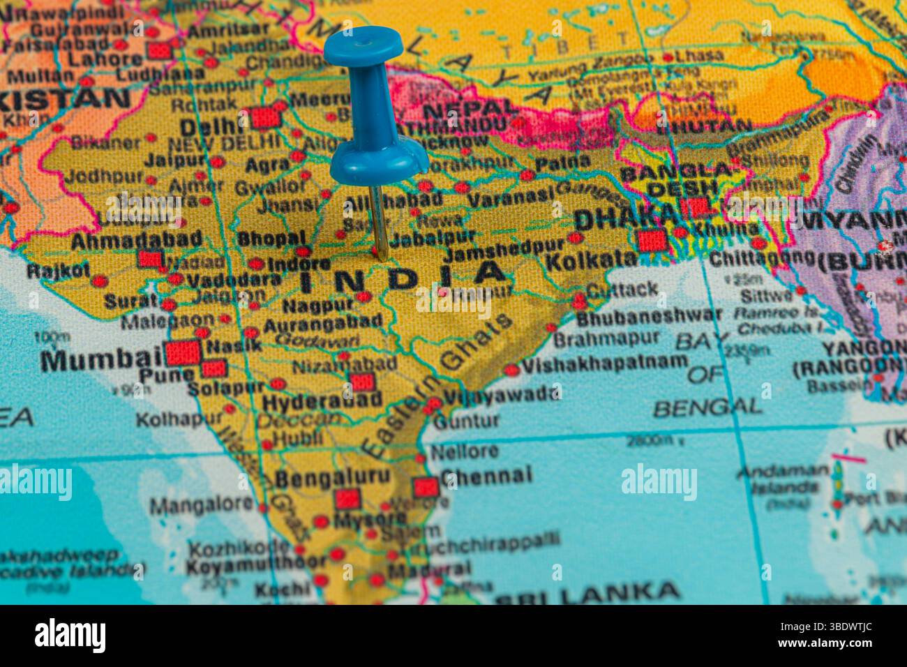 A detailed map of India highlights various cities and regions. A blue ...