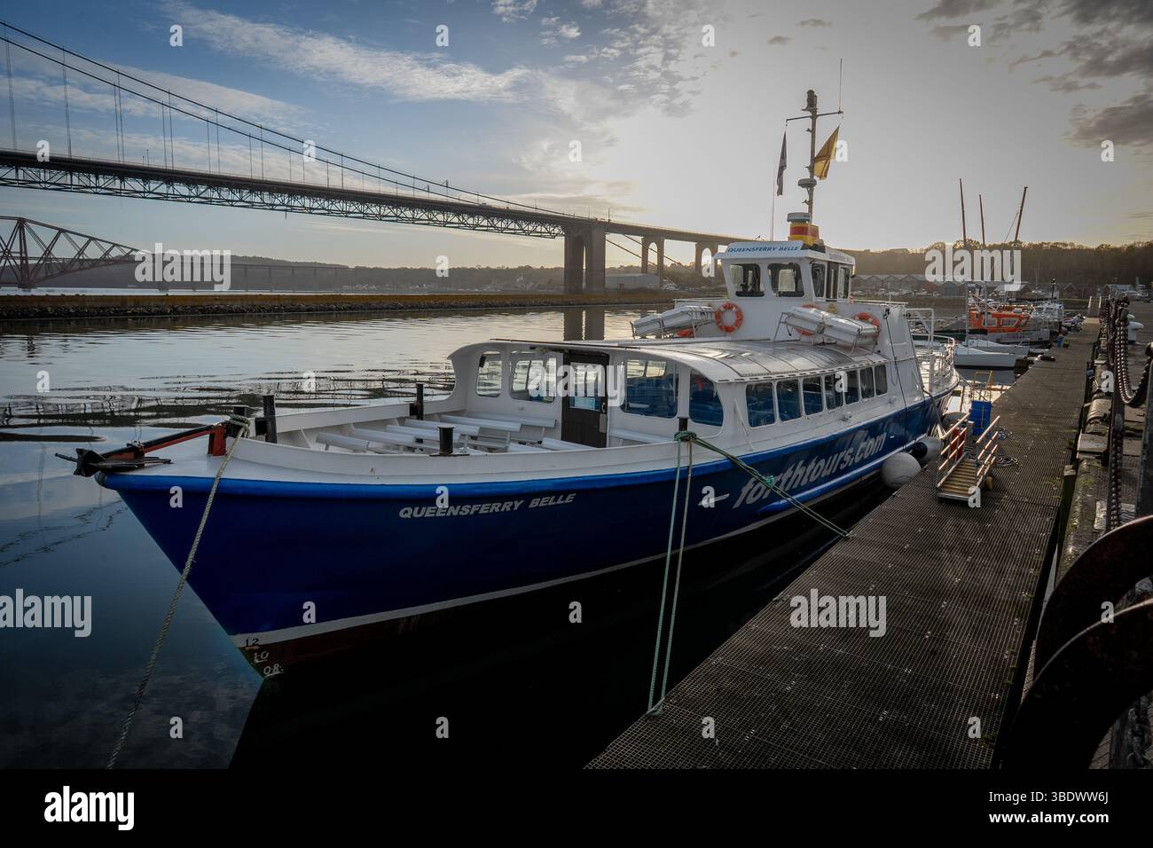 Boats in the harbour under the iconic Forth Road bridge Stock Photo - Alamy