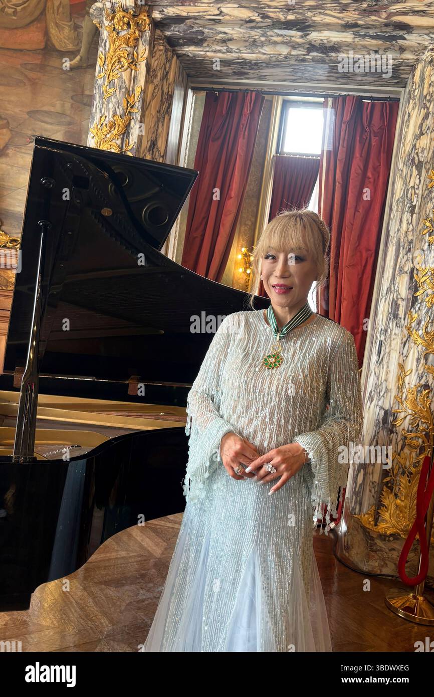 South Korean soprano singer Sumi Jo poses after being awarded ...