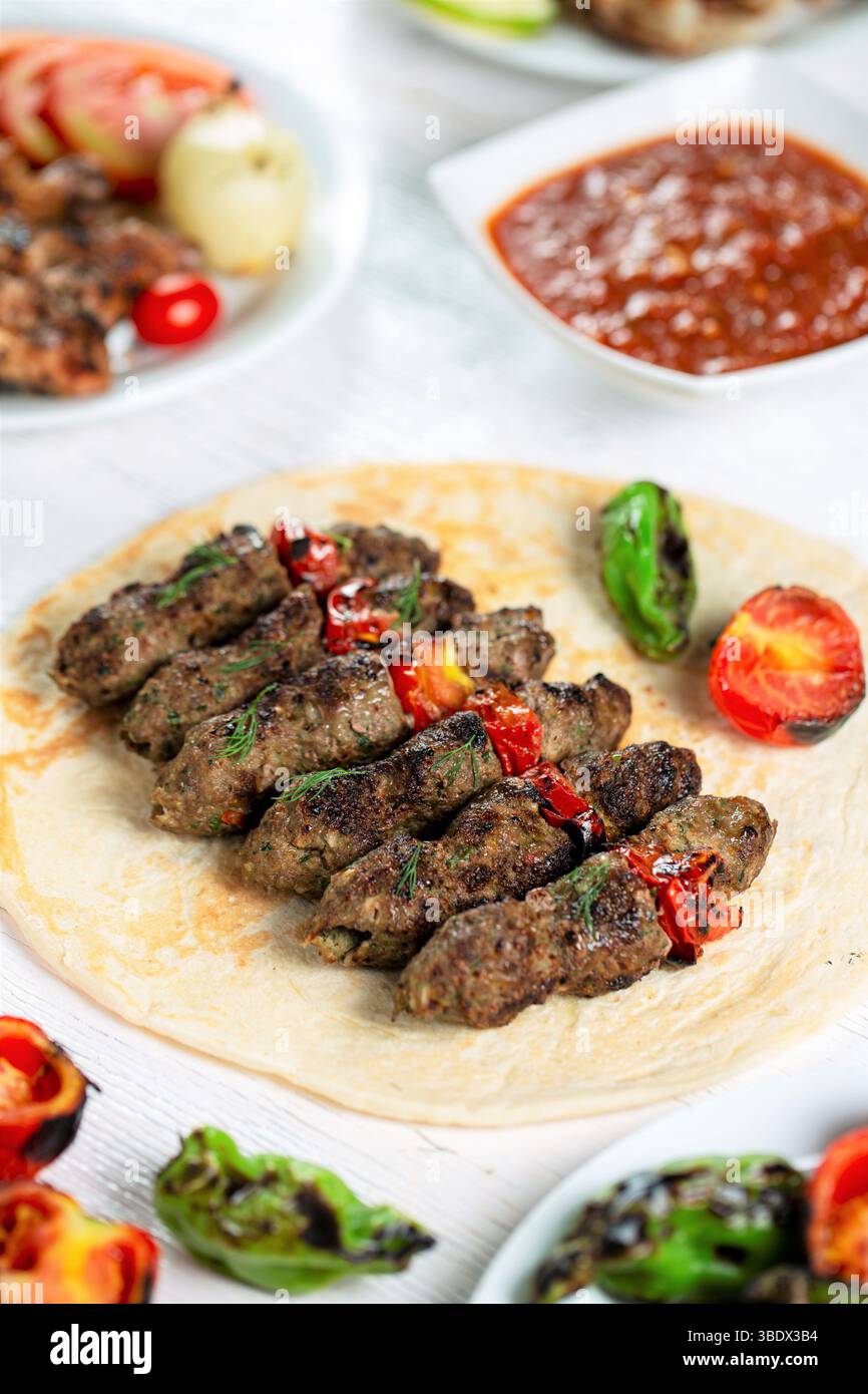 Grilled Arabic Kebab on Charcoal served with Fresh Salad – Traditional ...