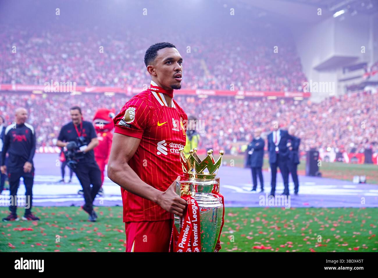 Liverpool's Trent Alexander-Arnold celebrates with the Premier League ...
