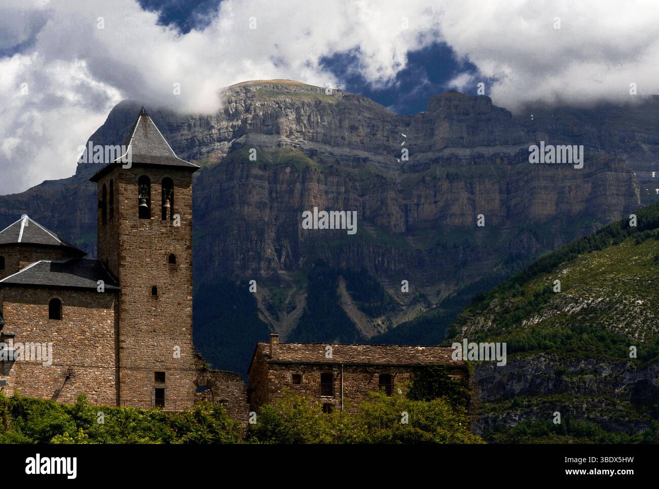 Former ancient abbey under fishscale roof at Torla-Ordesa, Huesca ...