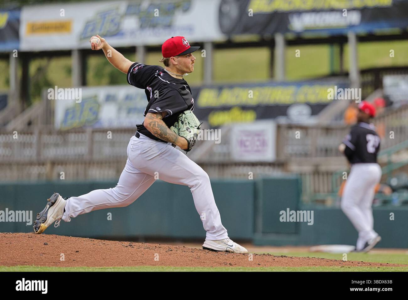 Hickory, NC: Hickory Crawdads pitcher Mason Molina (24) warms up in the ...