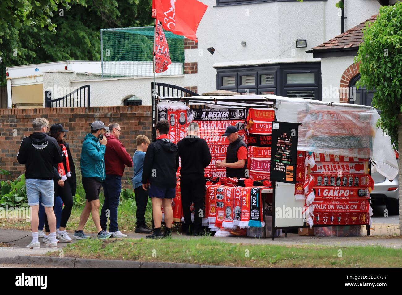 A stall selling scarves, flags and souvenirs for Liverpool fans and ...