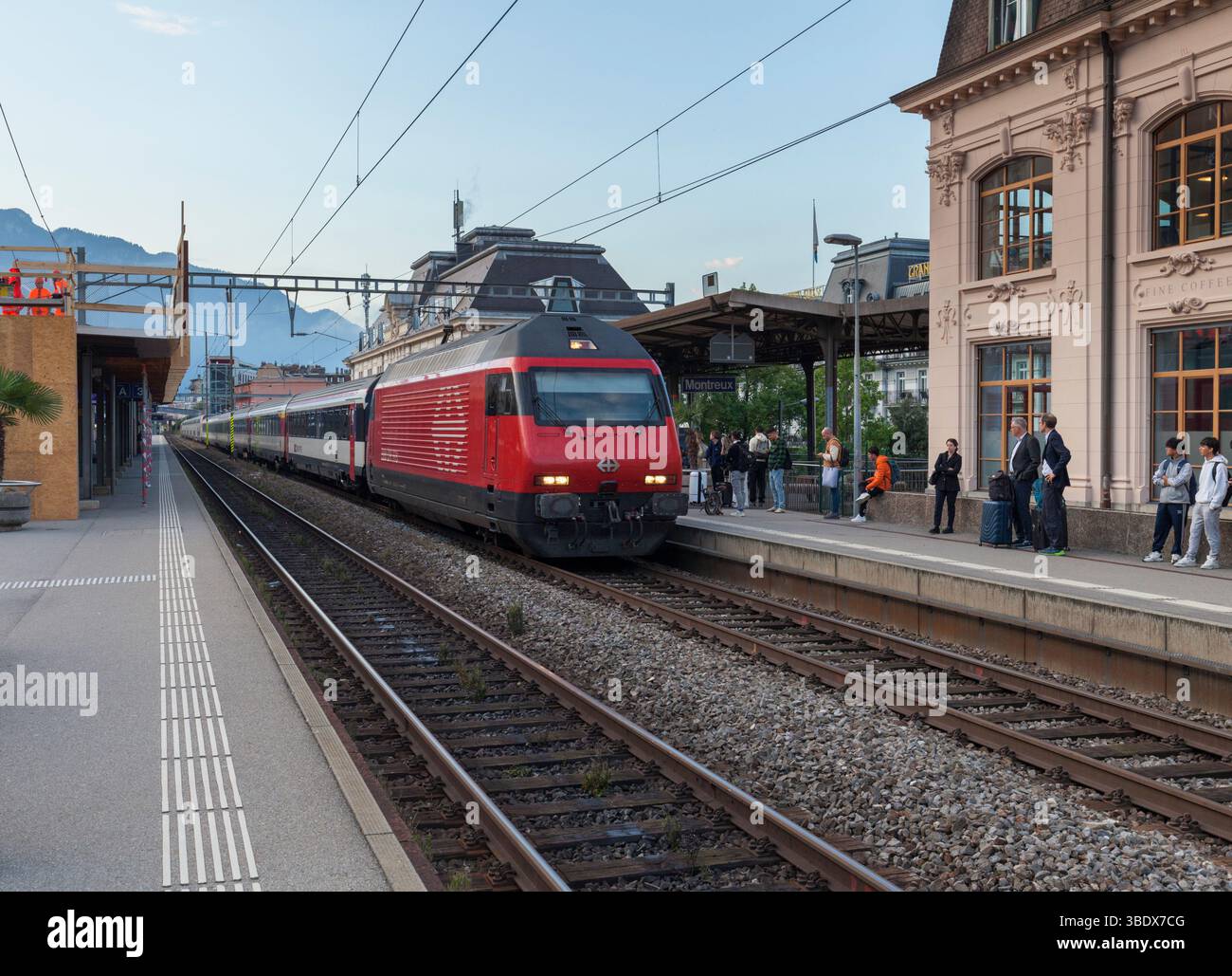 SBB Re 460 electric locomotive 460029 calling at Aigle Montreux railway station (Switzerland ...