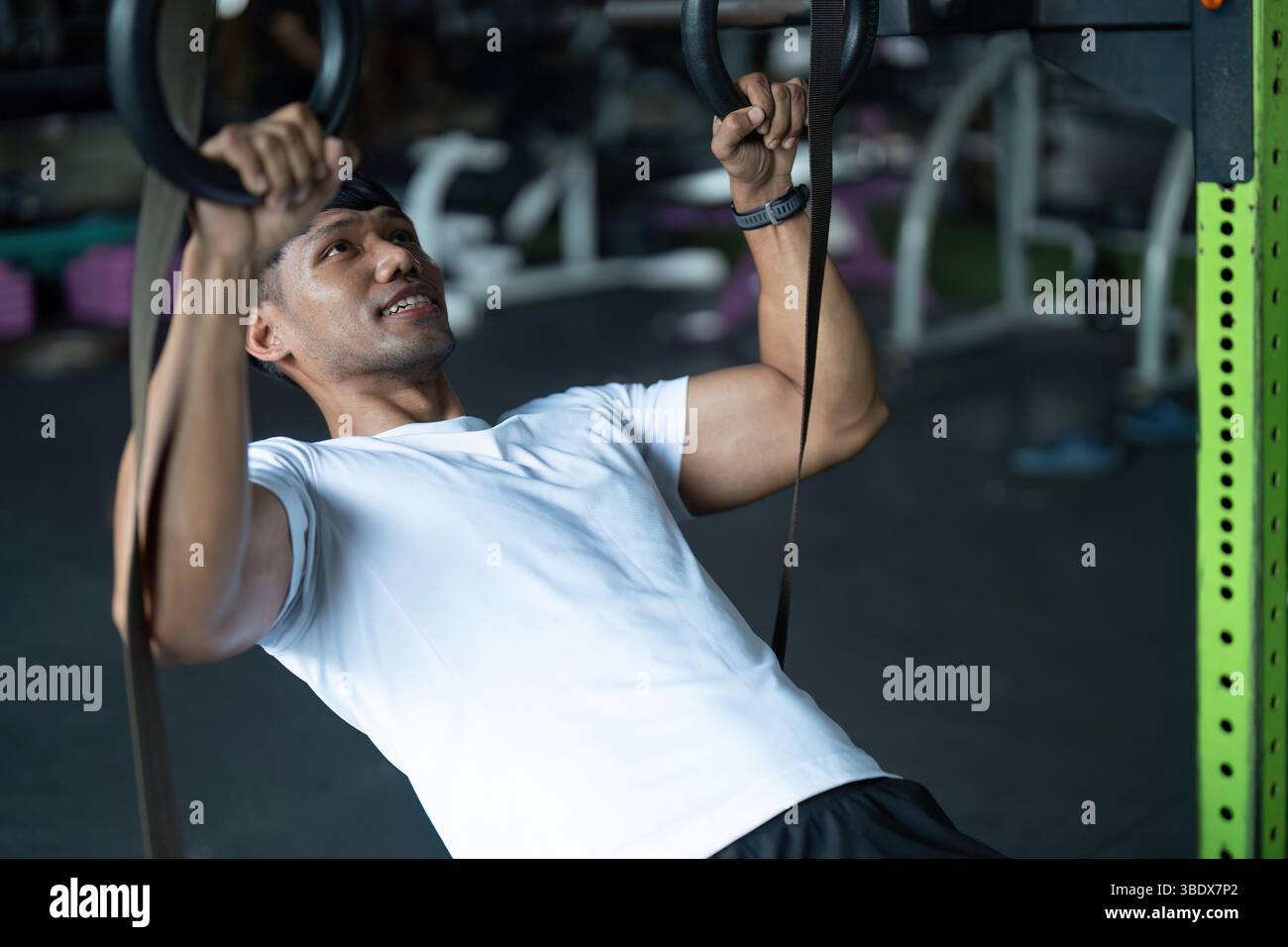 Strength Training: Young Man Engaging in Pull-Up Exercise Stock Photo ...