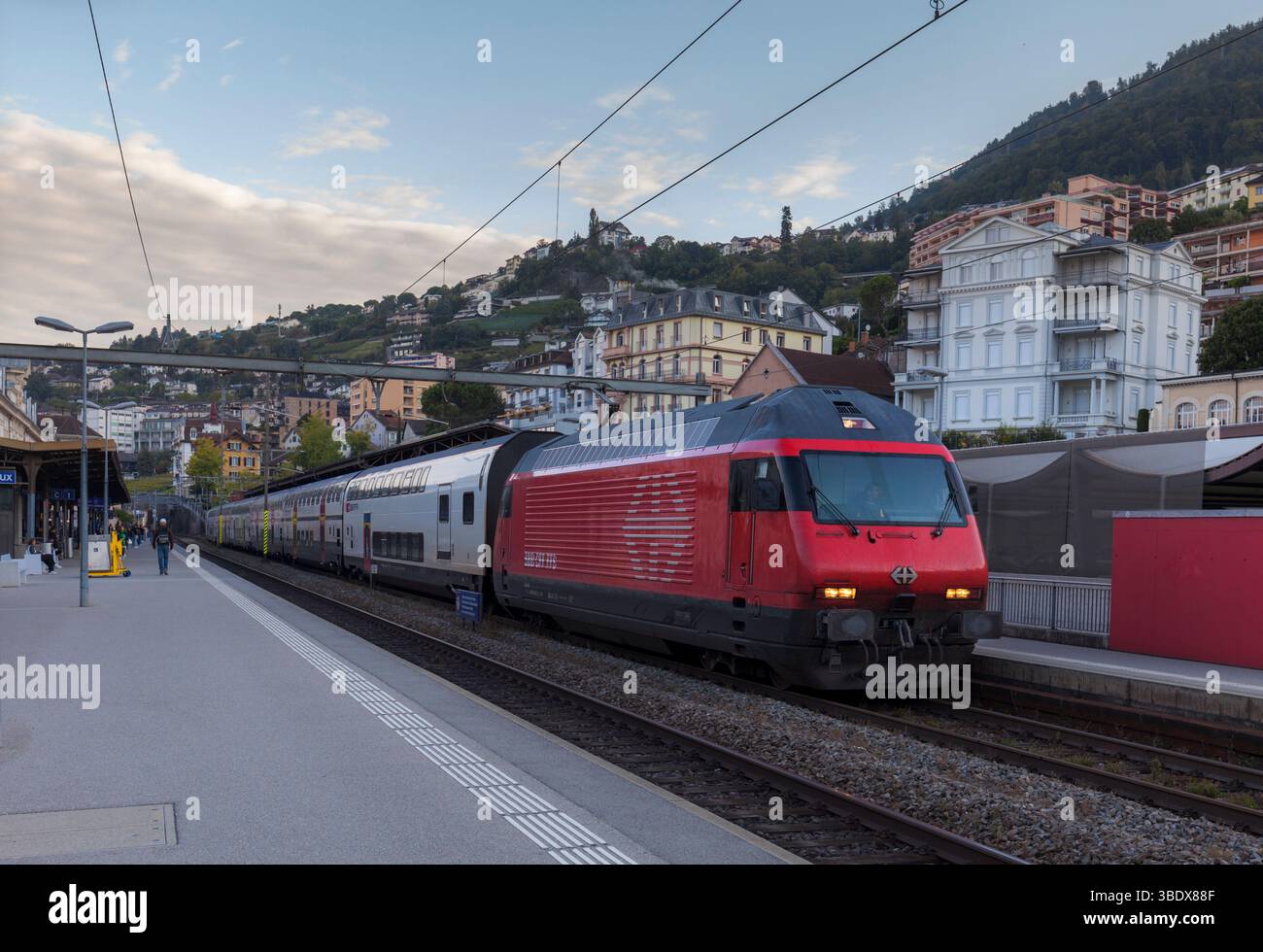 SBB Re 460 electric locomotive 460031 calling at Montreux railway station (Switzerland) with an ...