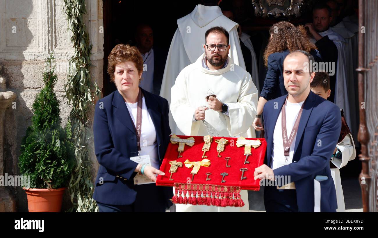 The ten keys that close the silver tomb of St. Teresa of Jesus, after her procession, on May 26 ...