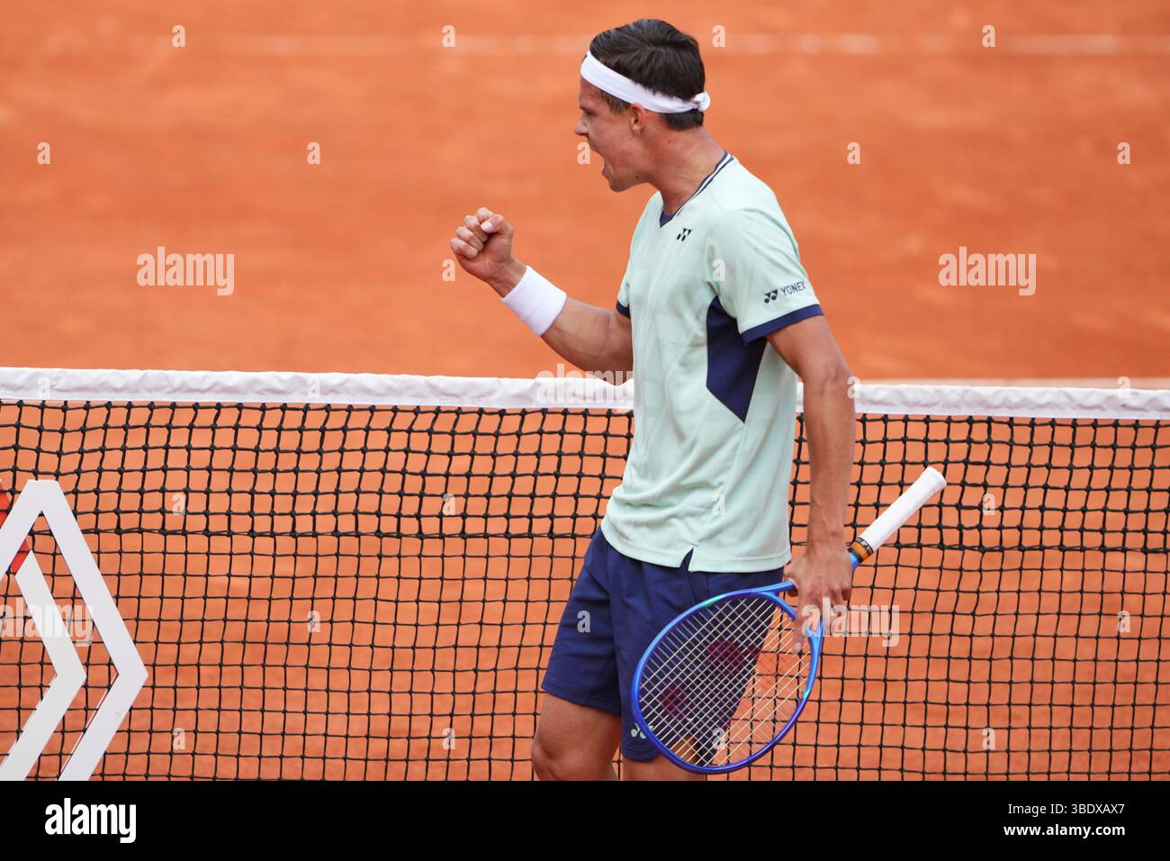 Germany's Daniel Altmaier reacts after winning the first set against ...