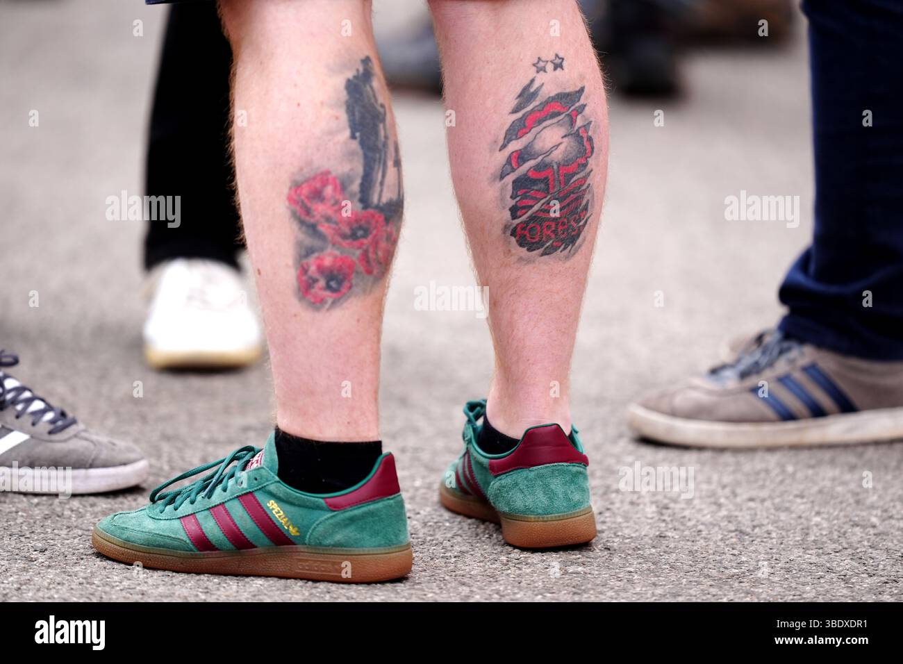 A tattoo of the club badge on the calf of a Nottingham Forest fan ...