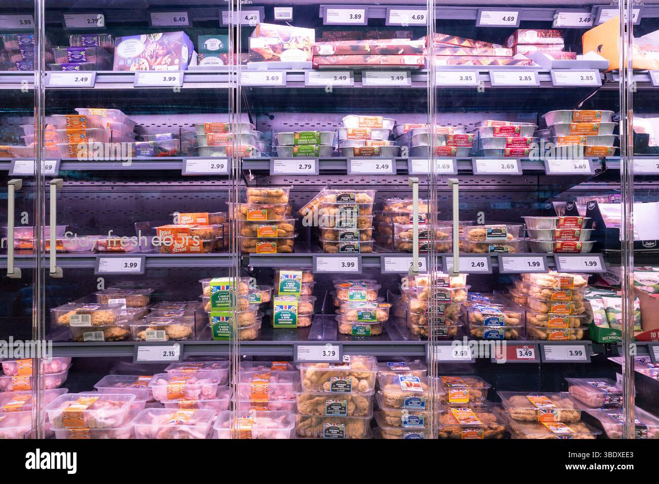 Packaged ready meals on sale display inside a Lidl supermarket in the ...