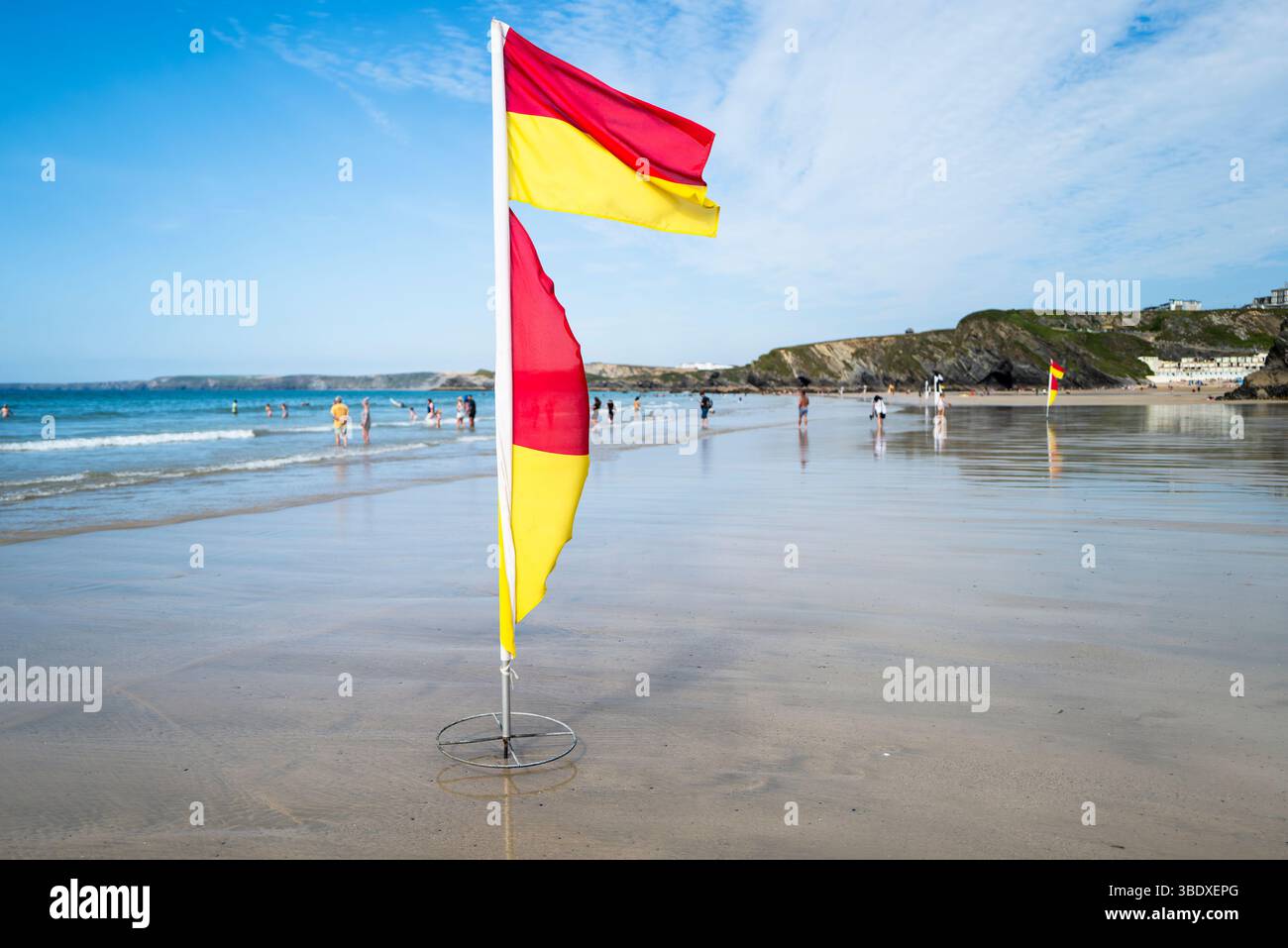 A red and yellow safety flag indicating the safe swimming area on Gt ...