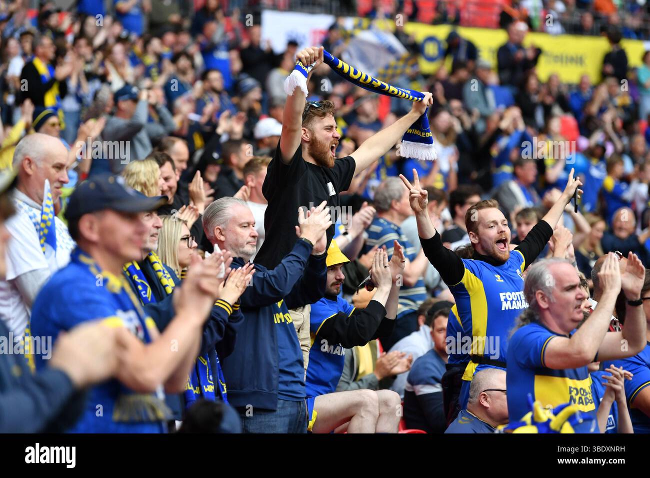London, England. 26th May 2025. AFC Wimbledon supporters before the Sky ...