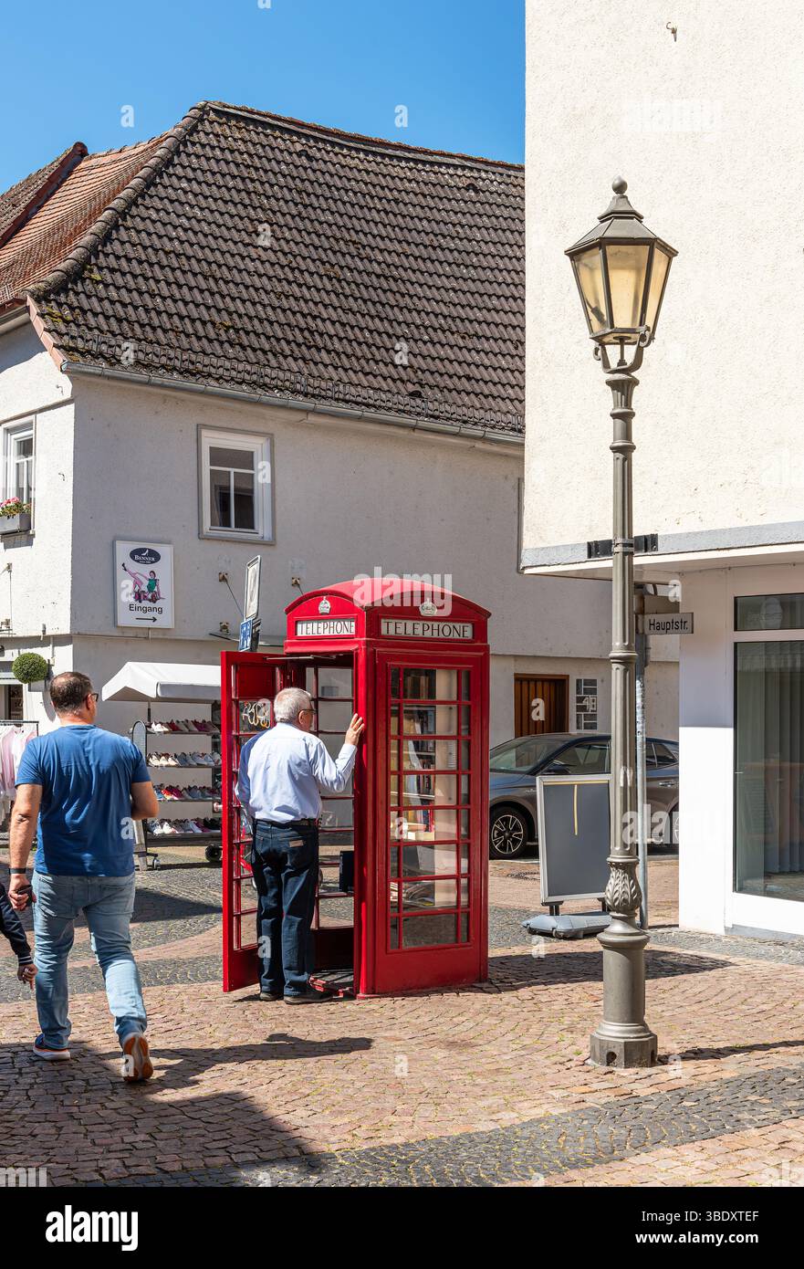 A free street library in an old red telephone booth Stock Photo - Alamy