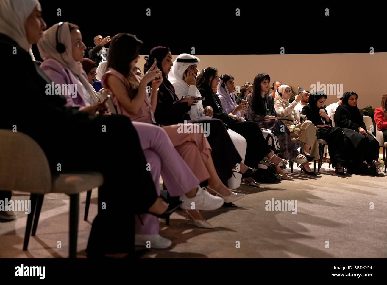 People attend a session at the Arab Media Summit 2025 in Dubai, United ...