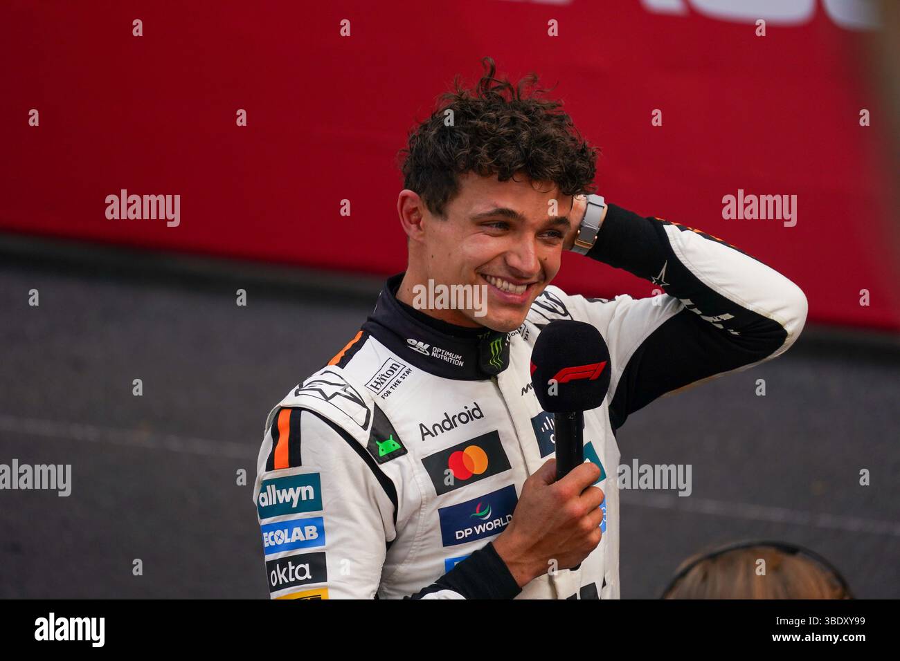 Lando Norris smiles during the Race of the Formula 1 TAG Heuer Grand ...