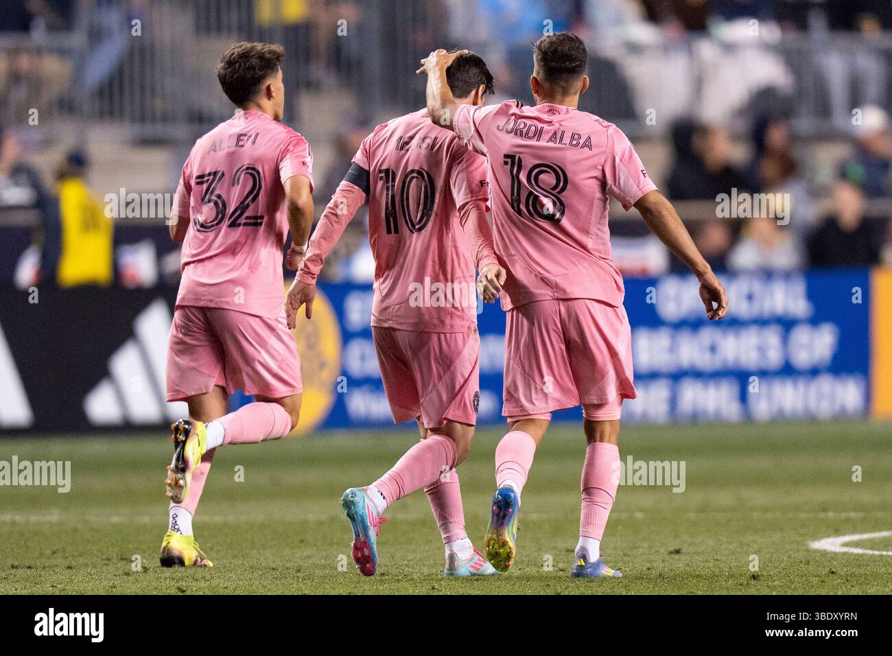 Inter Miami's Lionel Messi, center, celebrates his goal with Noah Allen ...