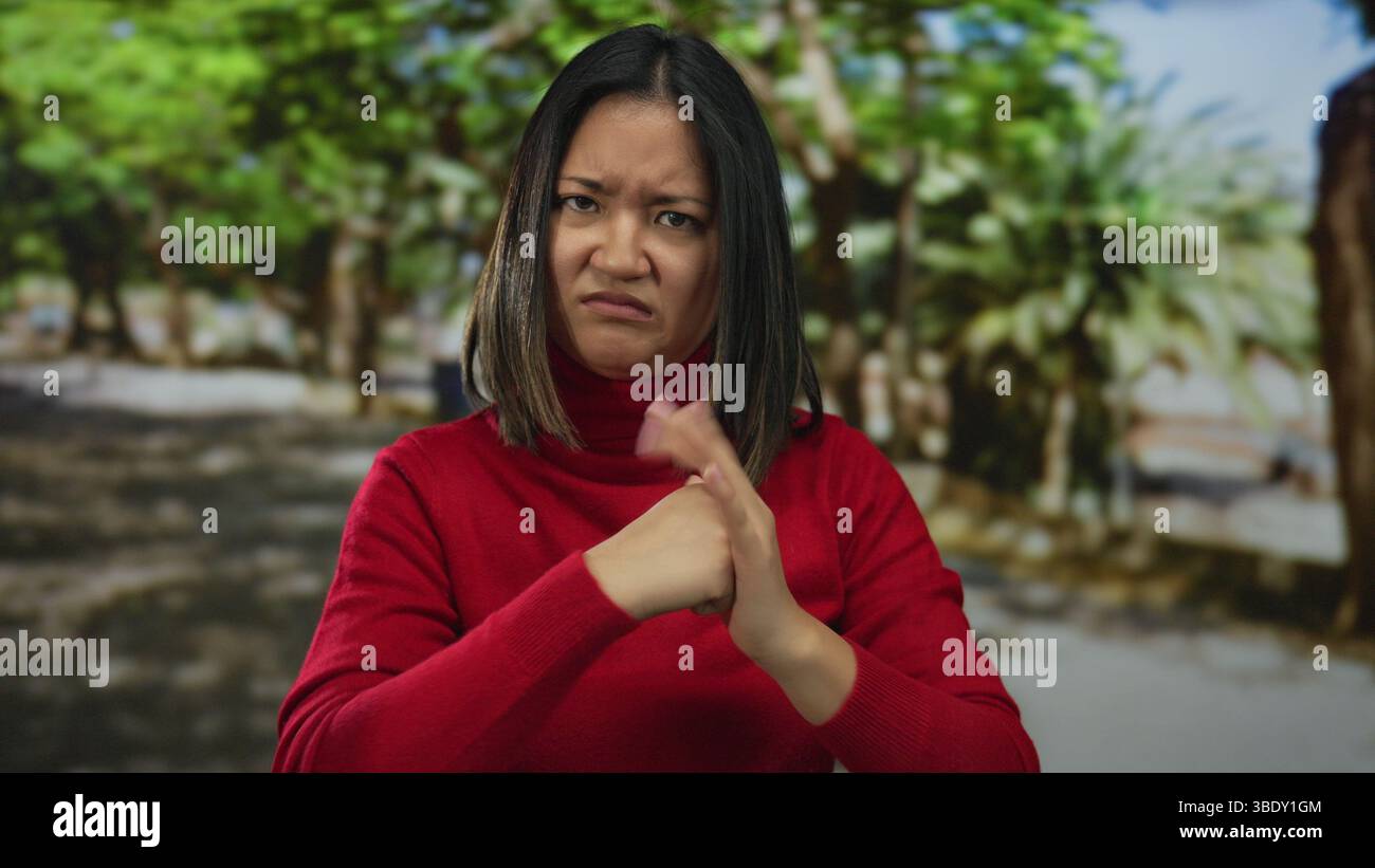 Woman making fist demonstrating hi-res stock photography and images - Alamy