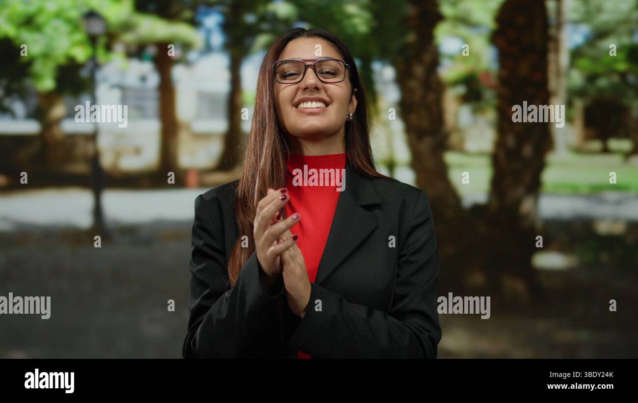 Woman clapping happily in sunny hi-res stock photography and images - Alamy