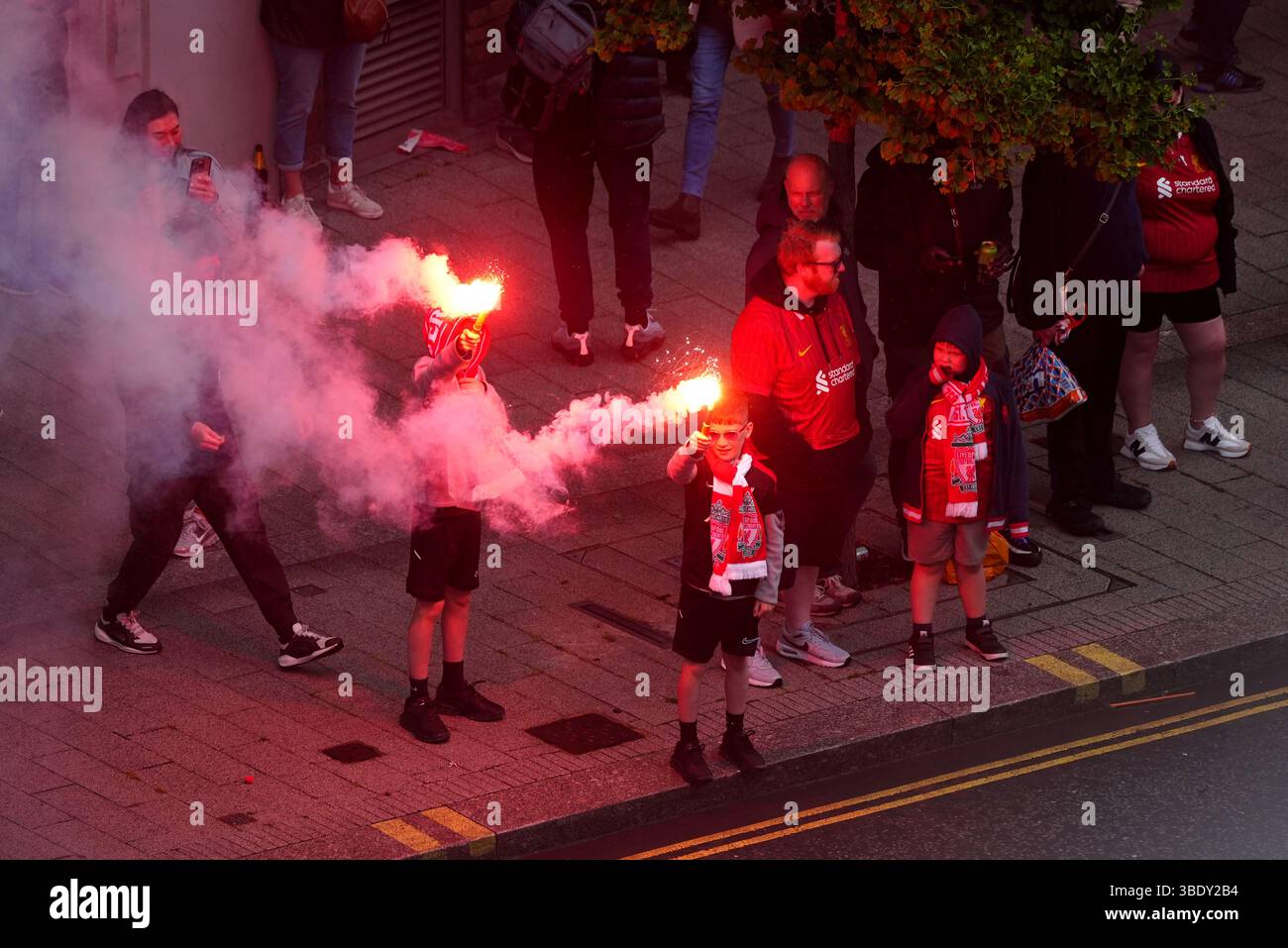 Liverpool fans set off smoke flares near Liverpool Waterfront as they ...