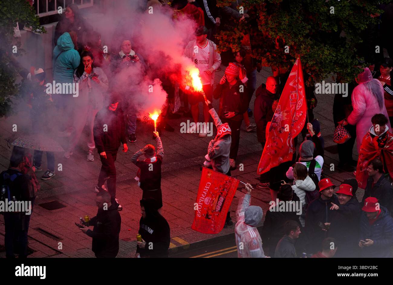 Liverpool fans set off smoke flares near Liverpool Waterfront as they ...