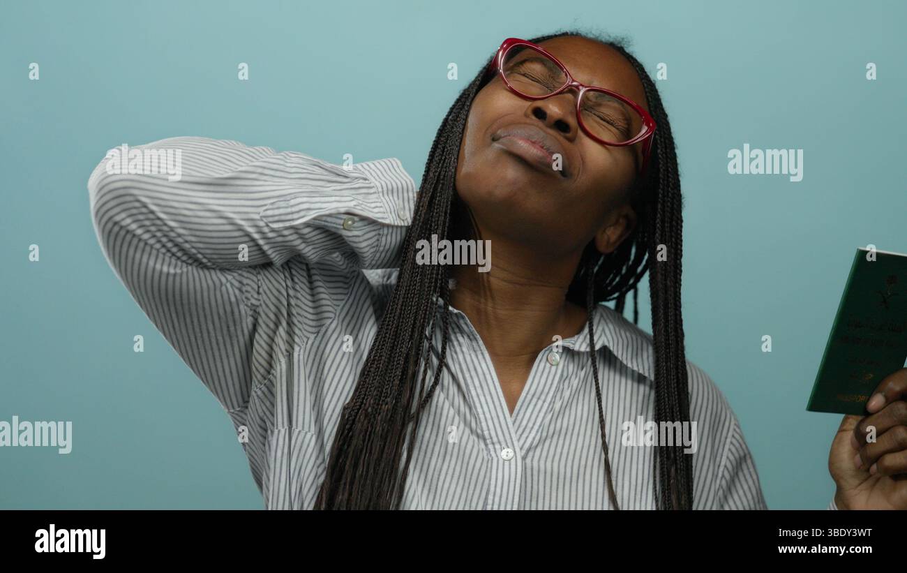 Woman holding saudi passport hi-res stock photography and images - Alamy