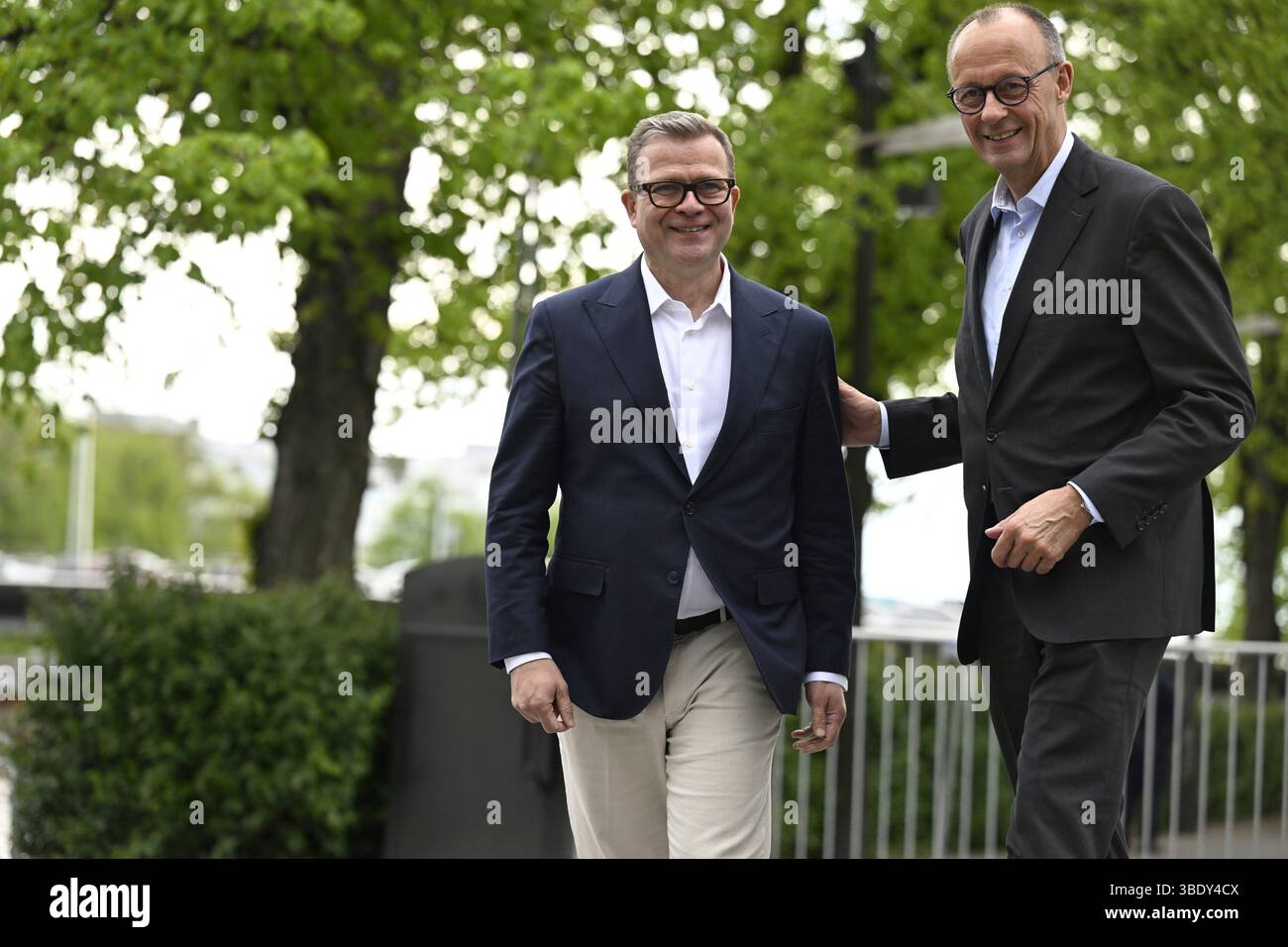 Finland's Prime Minister Petteri Orpo, left, and Germany's Chancellor ...