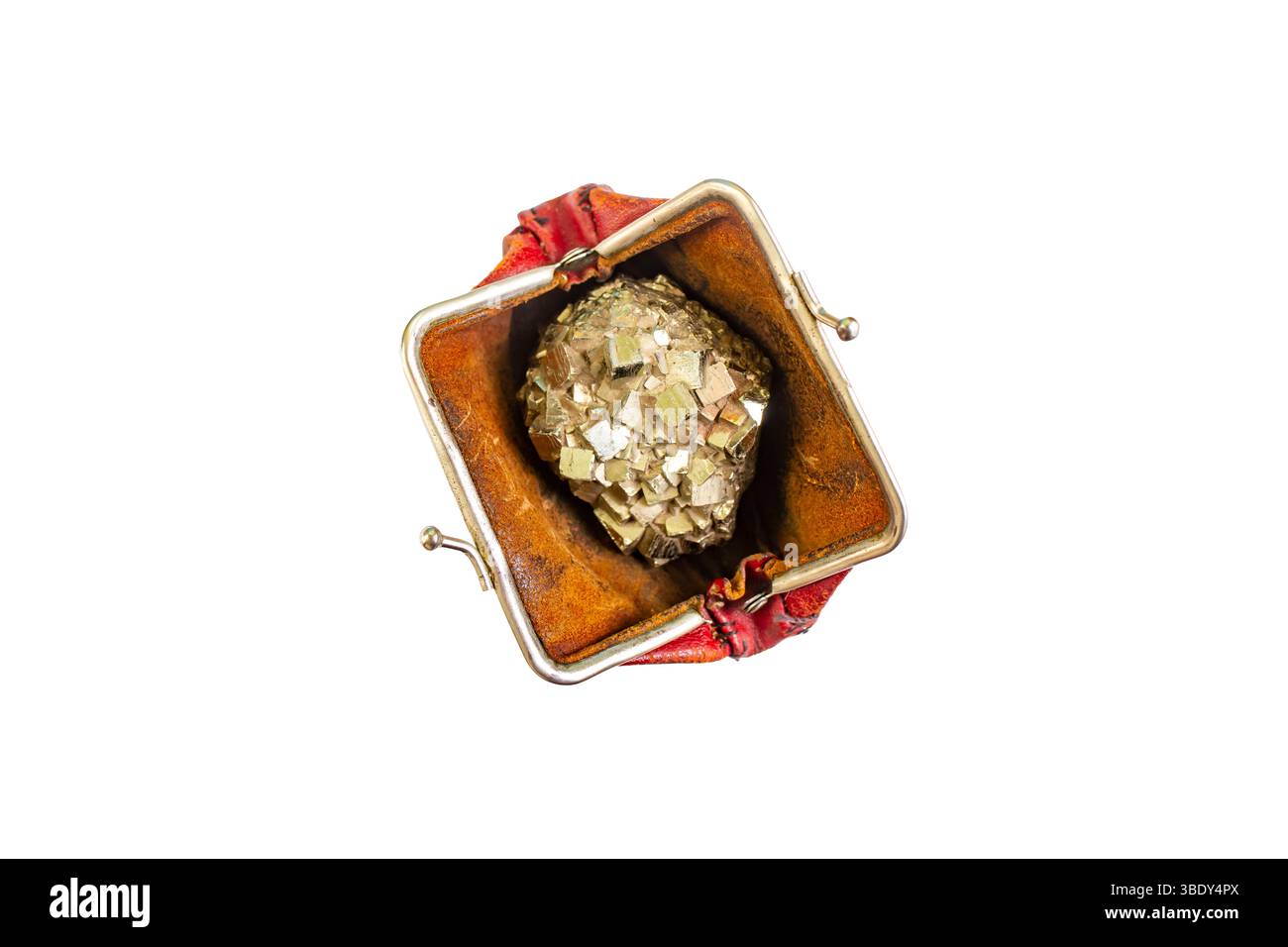 Golden ragged stone mineral inside a vintage leather coin wallet ...