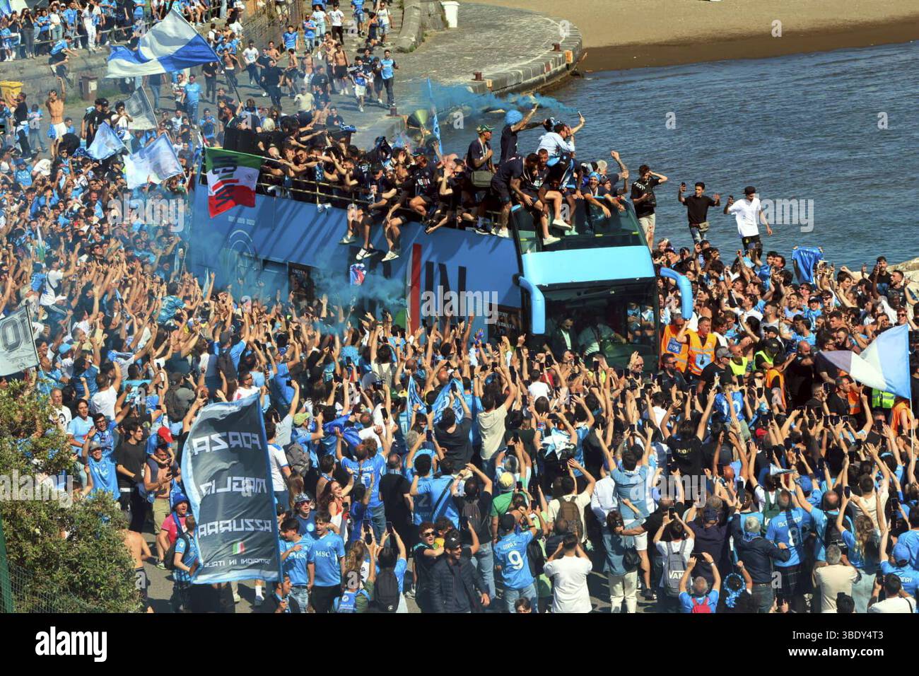 Napoli scudetto celebrations with the open-top bus along the seafront ...