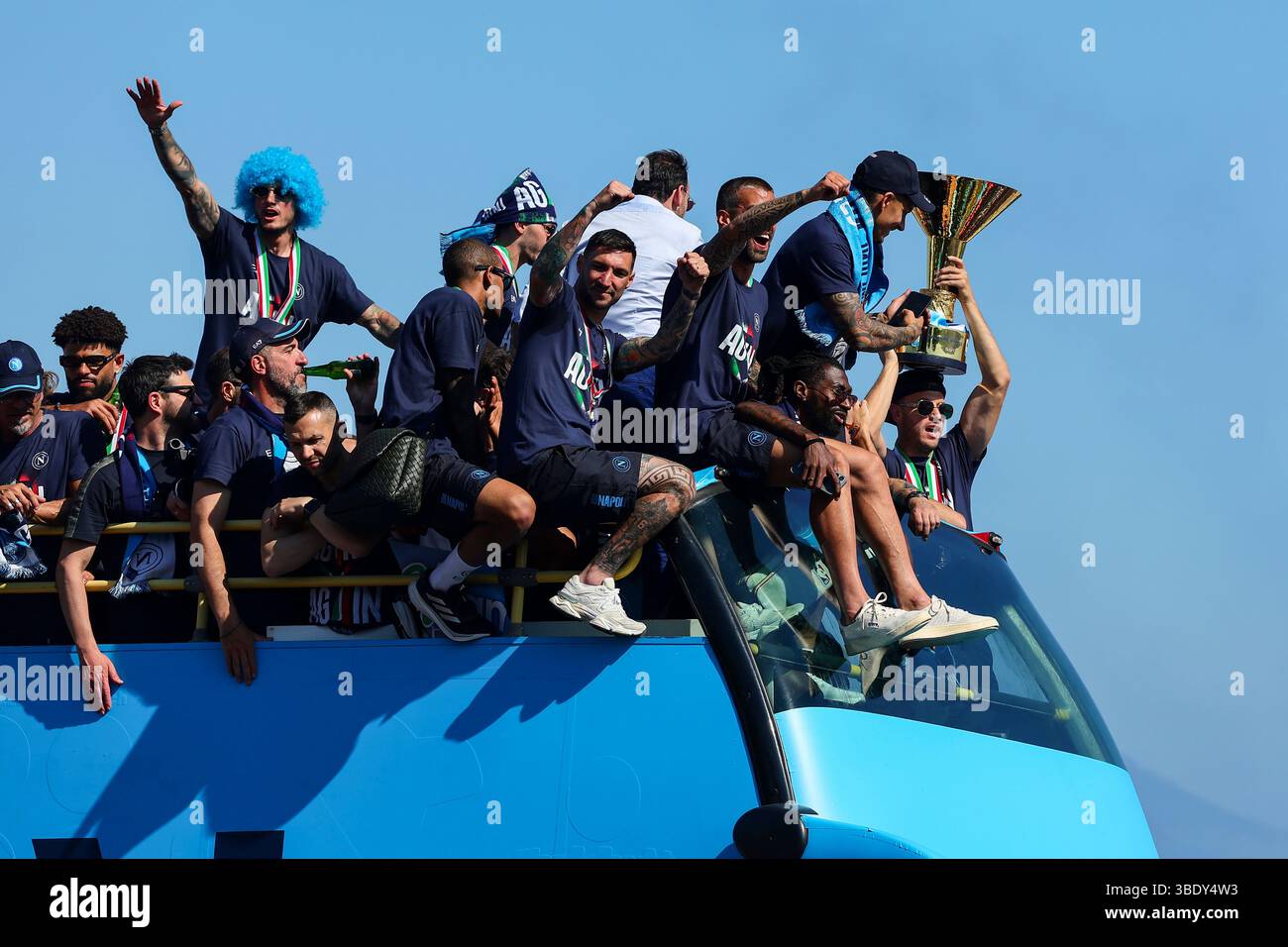 Napoli, Italy. 26th May, 2025. Napoli players celebrate on an open-top ...