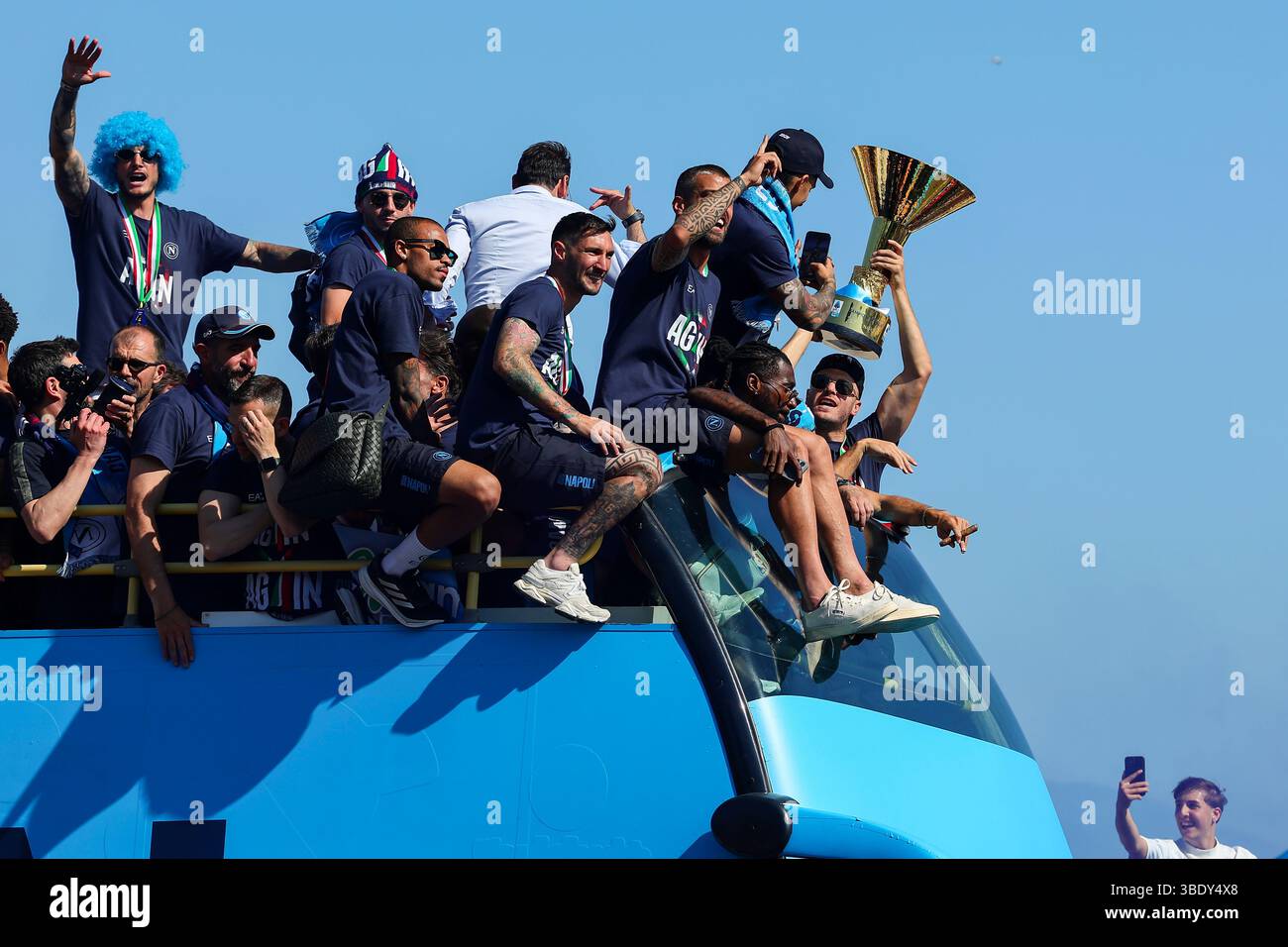 Napoli, Italy. 26th May, 2025. Napoli players celebrate on an open-top ...