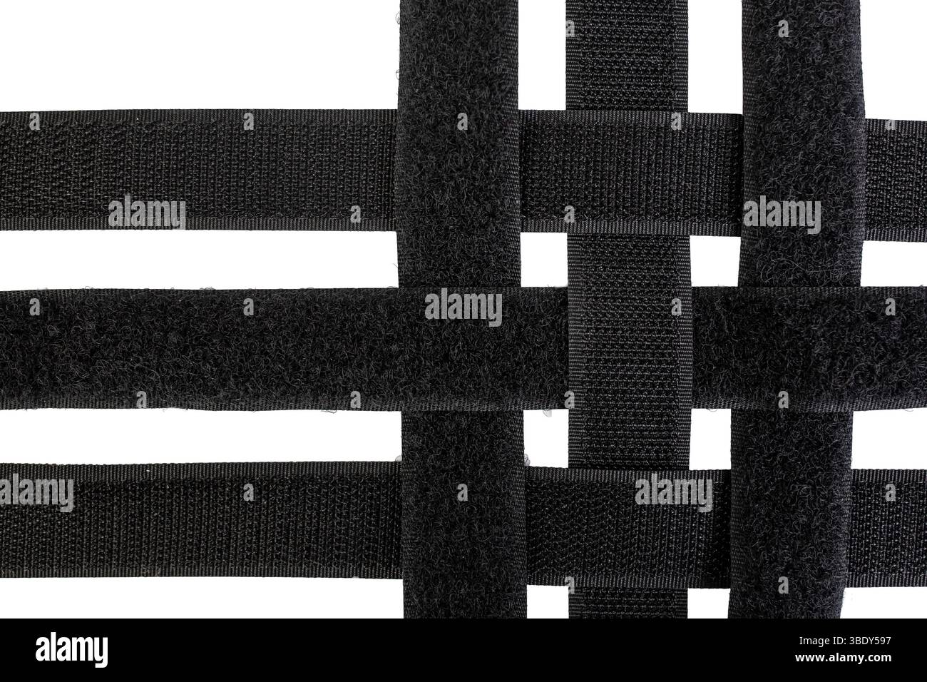 Velcro sticky tape strips pairs overlapping in a grid pattern, isolated ...