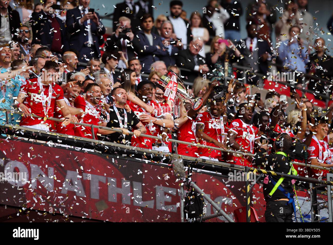 London, UK. 25th May, 2025. Charlton Athletic lift the trophy during ...
