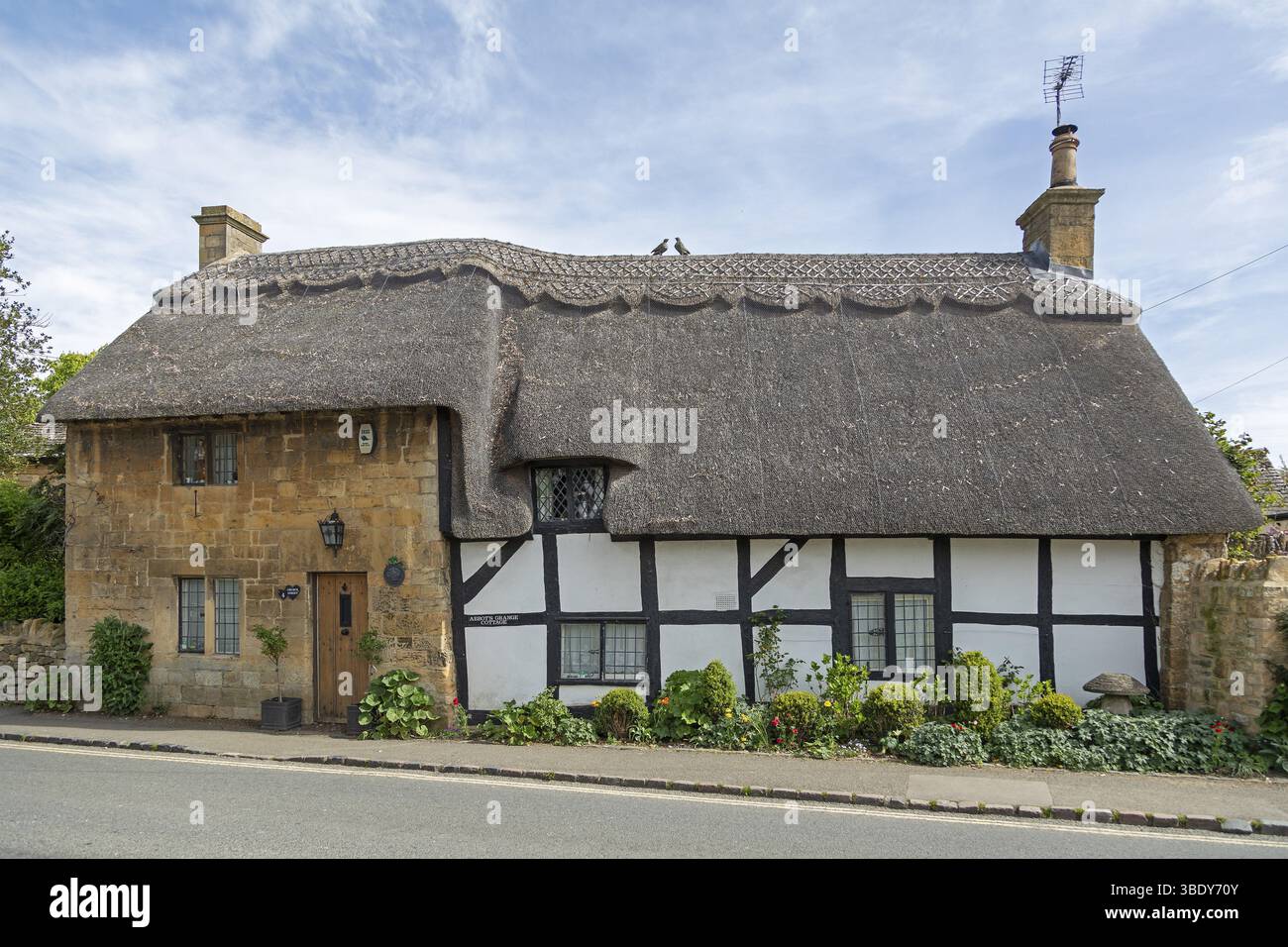 Honey-coloured house, half-timbered house, thatched house, Church ...