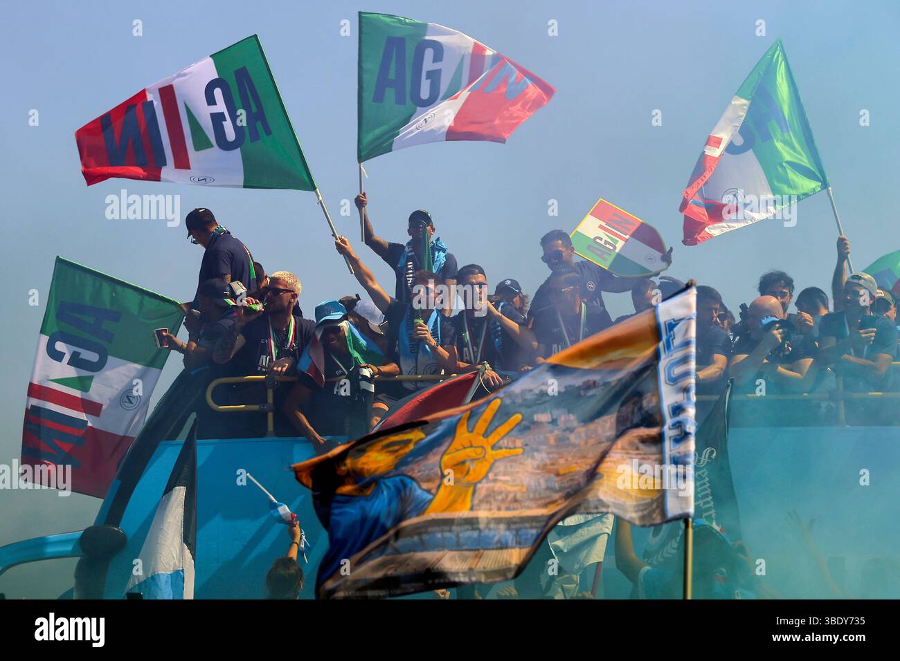 Napoli, Italy. 26th May, 2025. Napoli players celebrate on an open-top ...