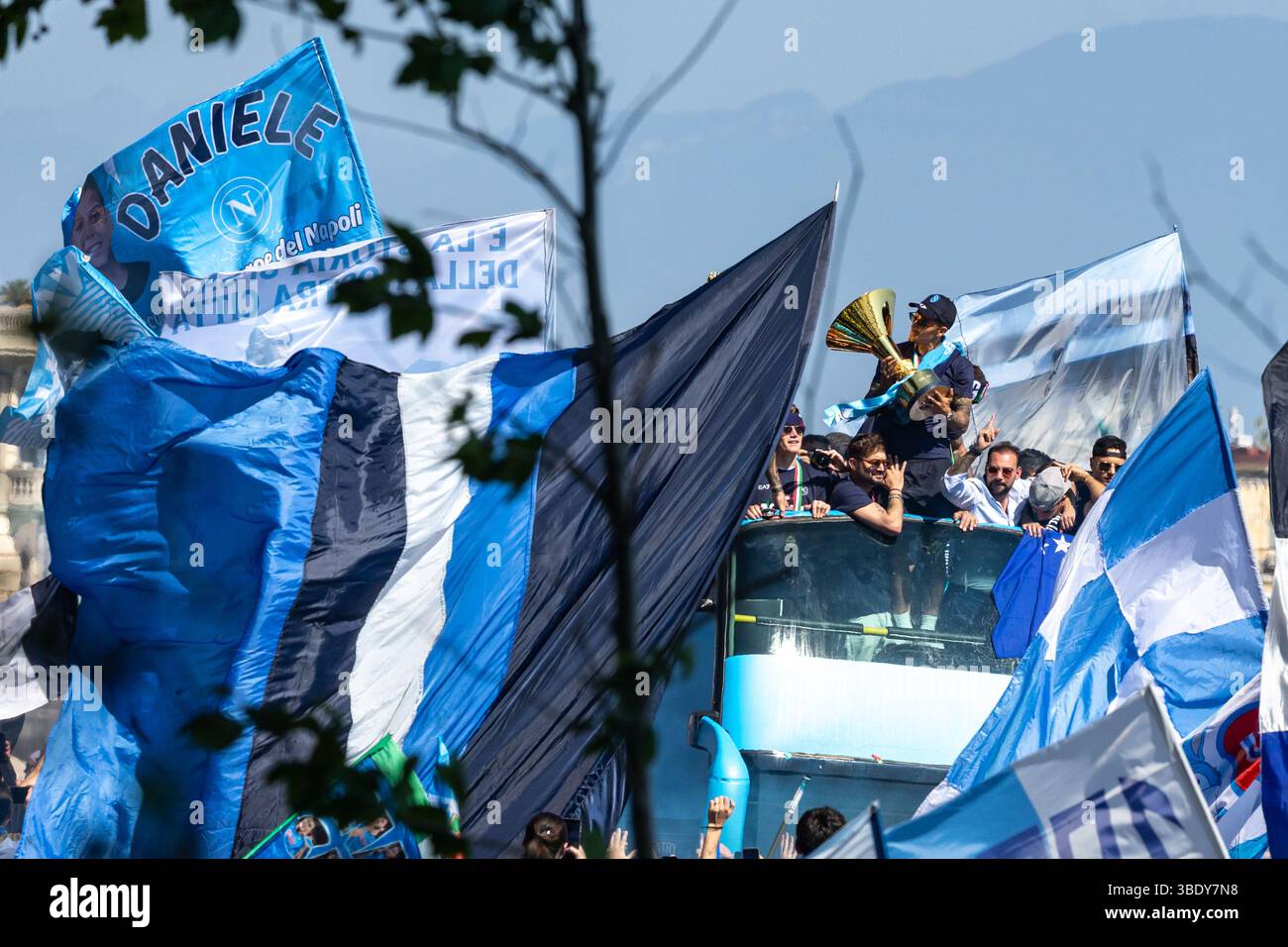 Napoli players and staff parade on a bus to celebrate the scudetto ...
