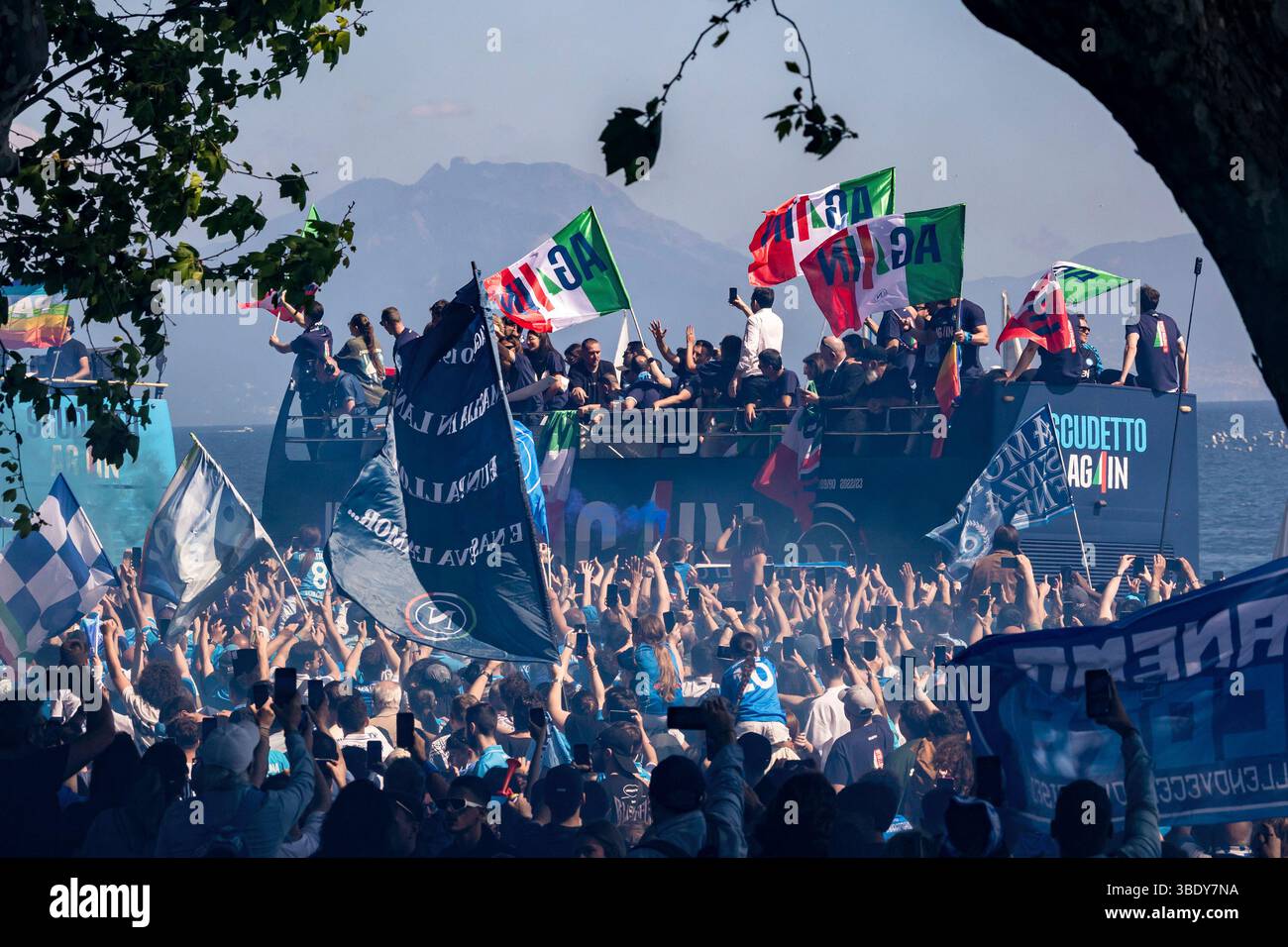 Napoli players and staff parade on a bus to celebrate the scudetto ...