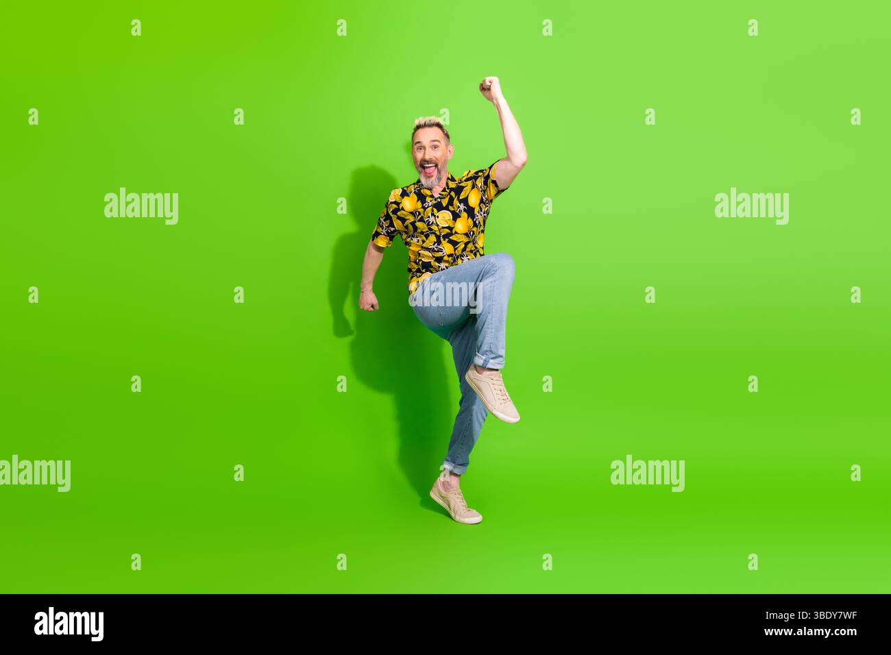 Man energetically poses in bright hi-res stock photography and images ...