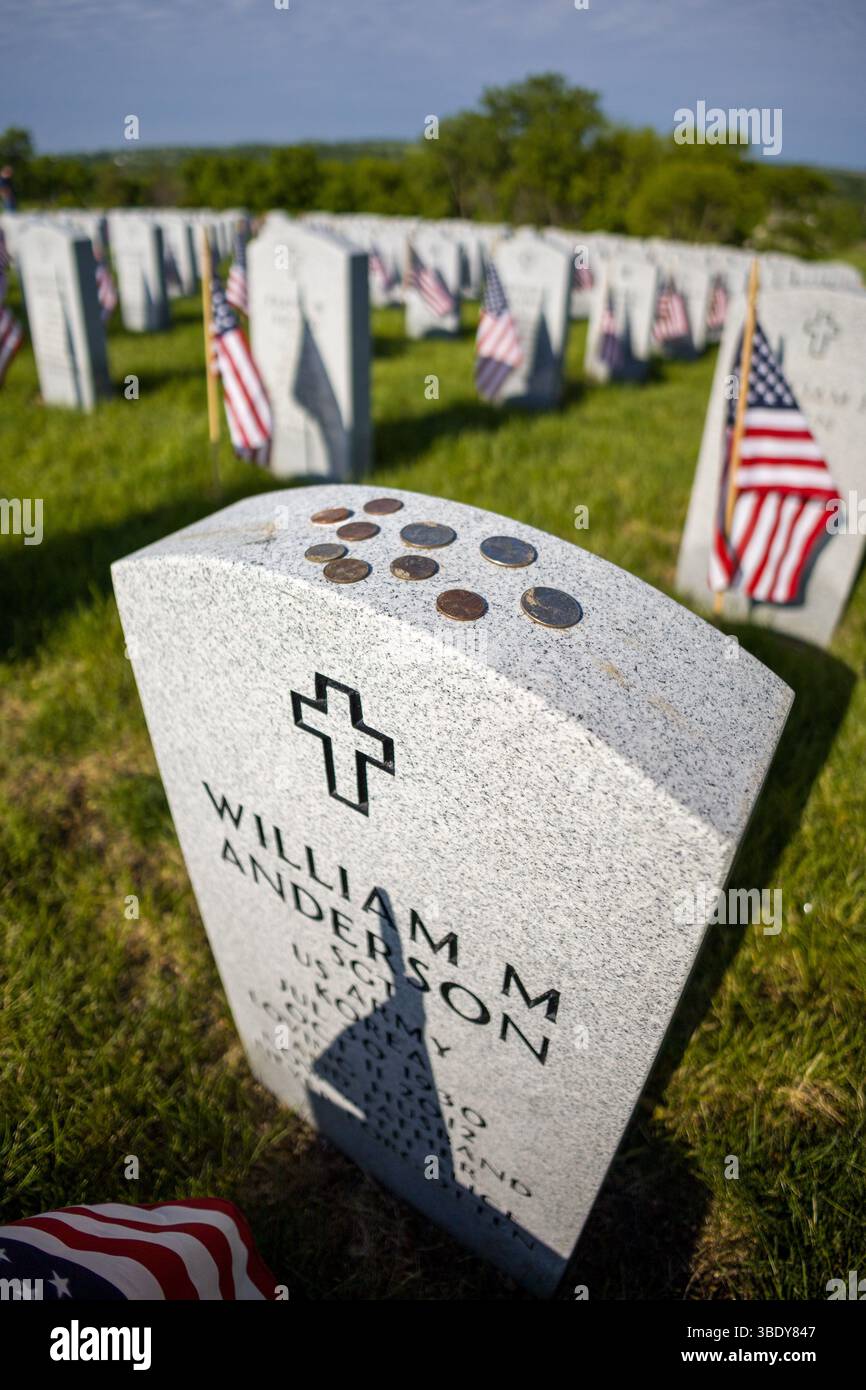 Van Meter, Iowa, USA. 26th May, 2025. Coins planed by visitors to ...