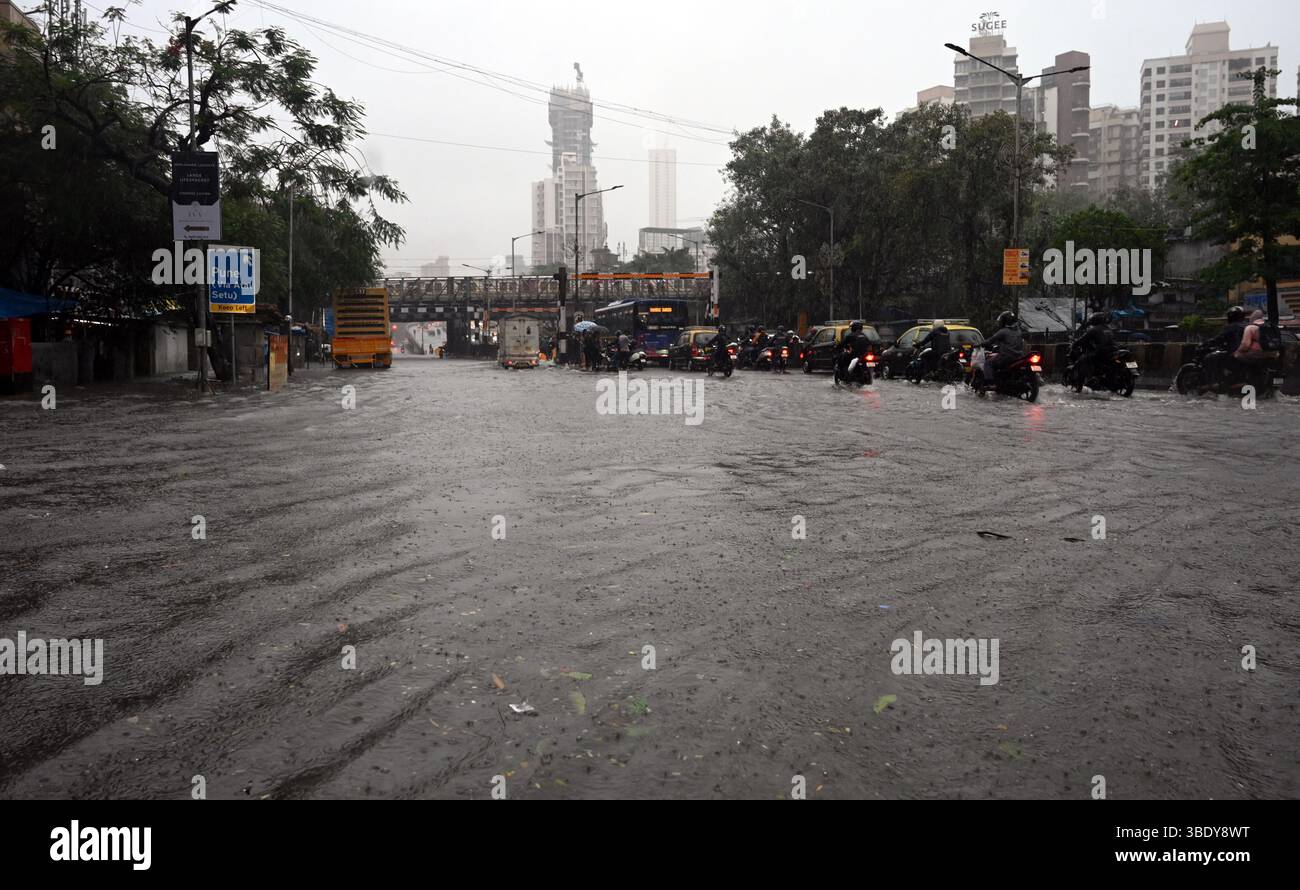 MUMBAI, INDIA - MAY 26: Waterlogged road at Gandhi Market in the Sion area after heavy rain on ...