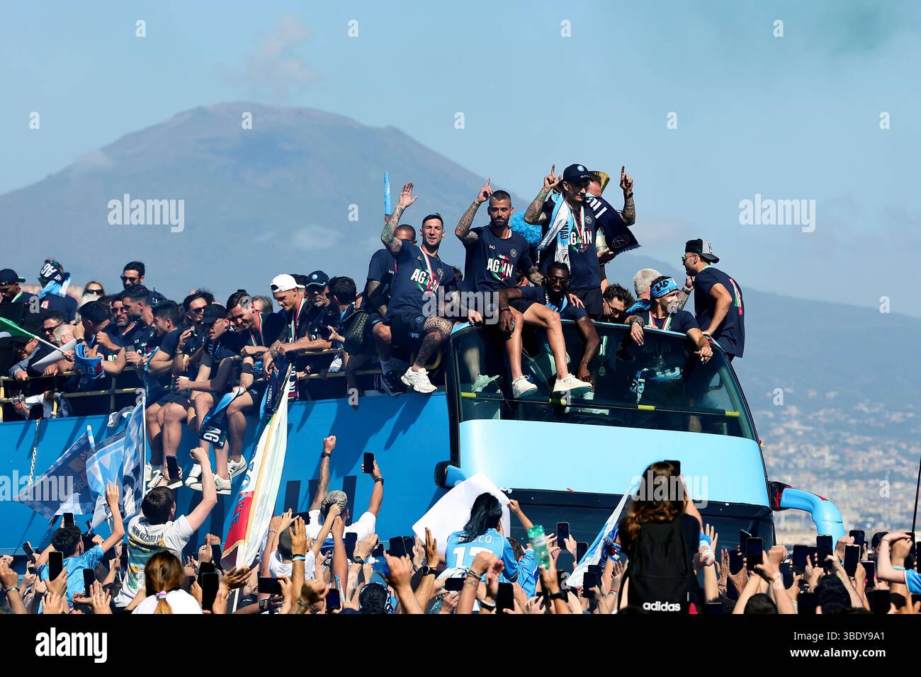 Napoli, Italy. 26th May, 2025. Napoli players celebrate on an open-top ...
