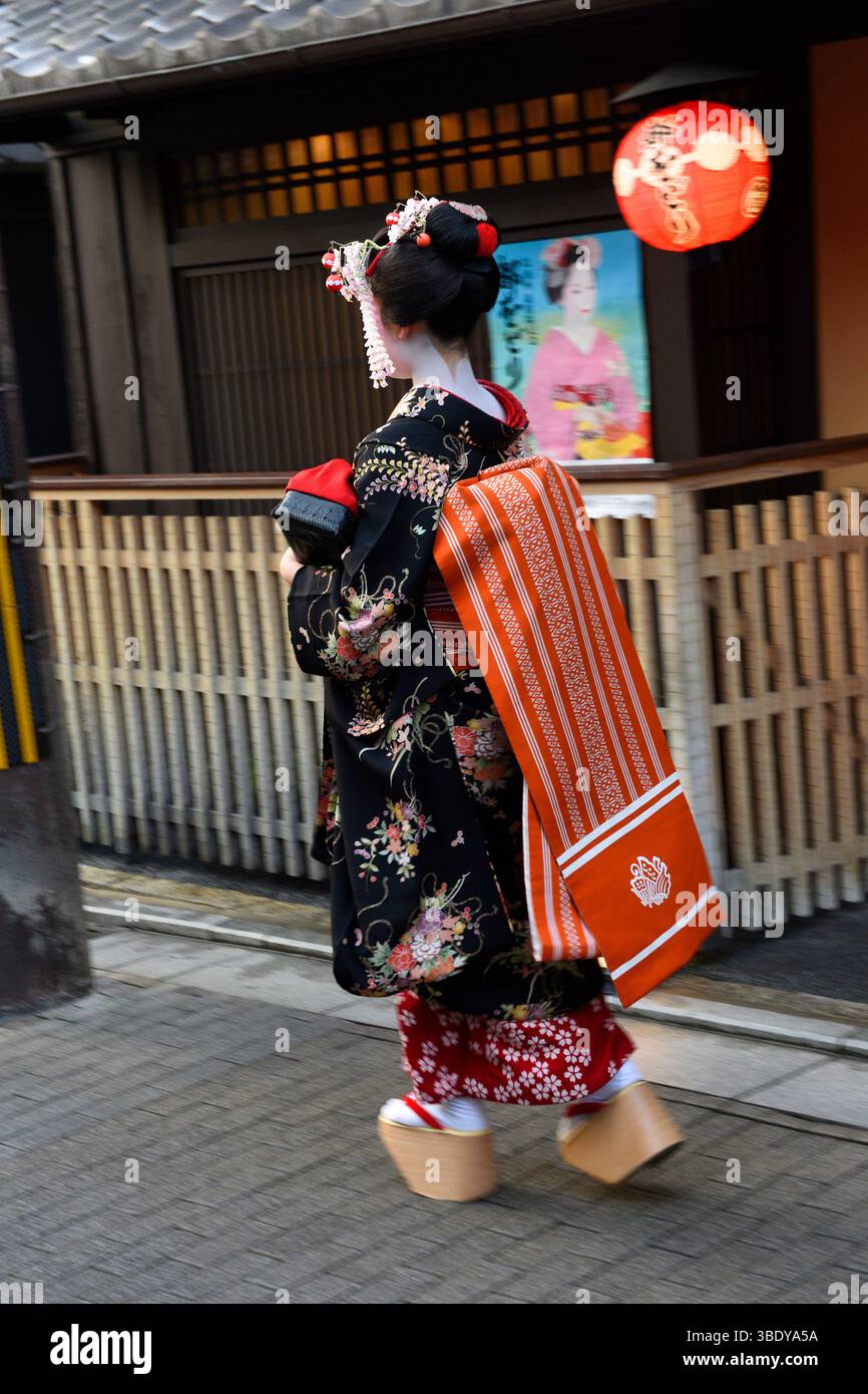 Geisha walking on a street of Gion in Kyoto,Japan,Asia Stock Photo - Alamy