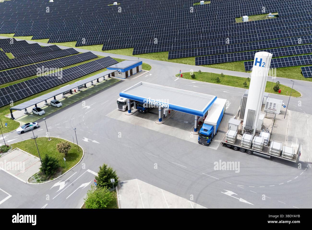 Hydrogen fuel station with fueling trucks and solar canopy with ...