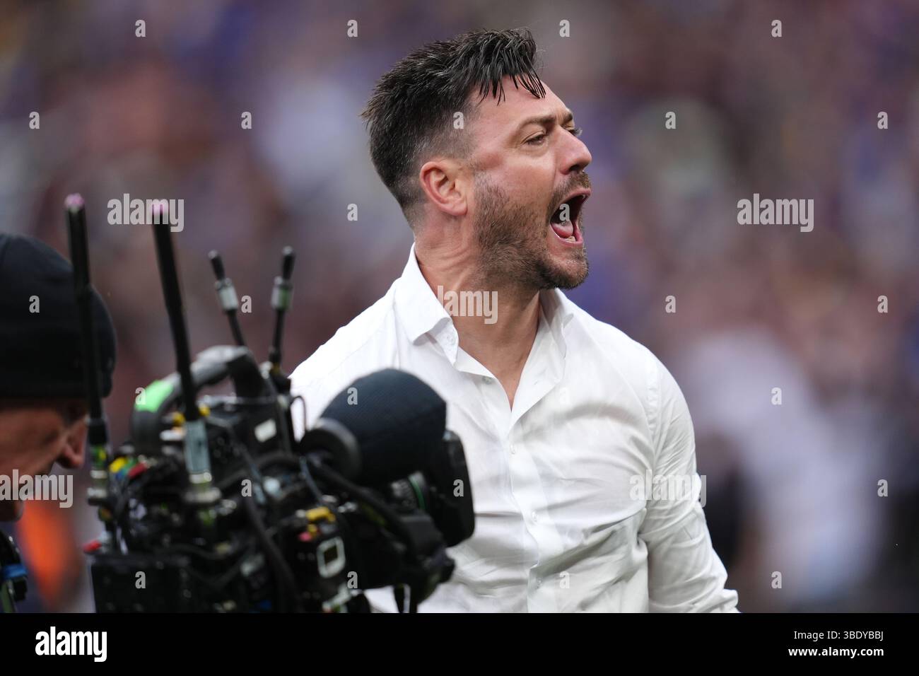 AFC Wimbledon manager Johnnie Jackson celebrates after the final ...