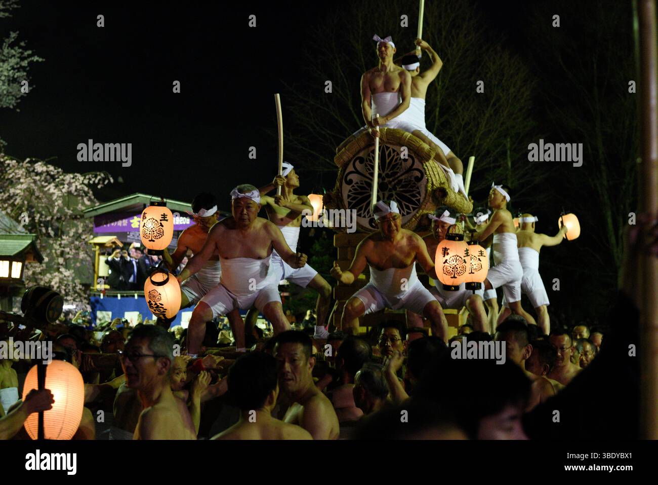 Men in loincloths performs a ritual for good luck to residents during ...